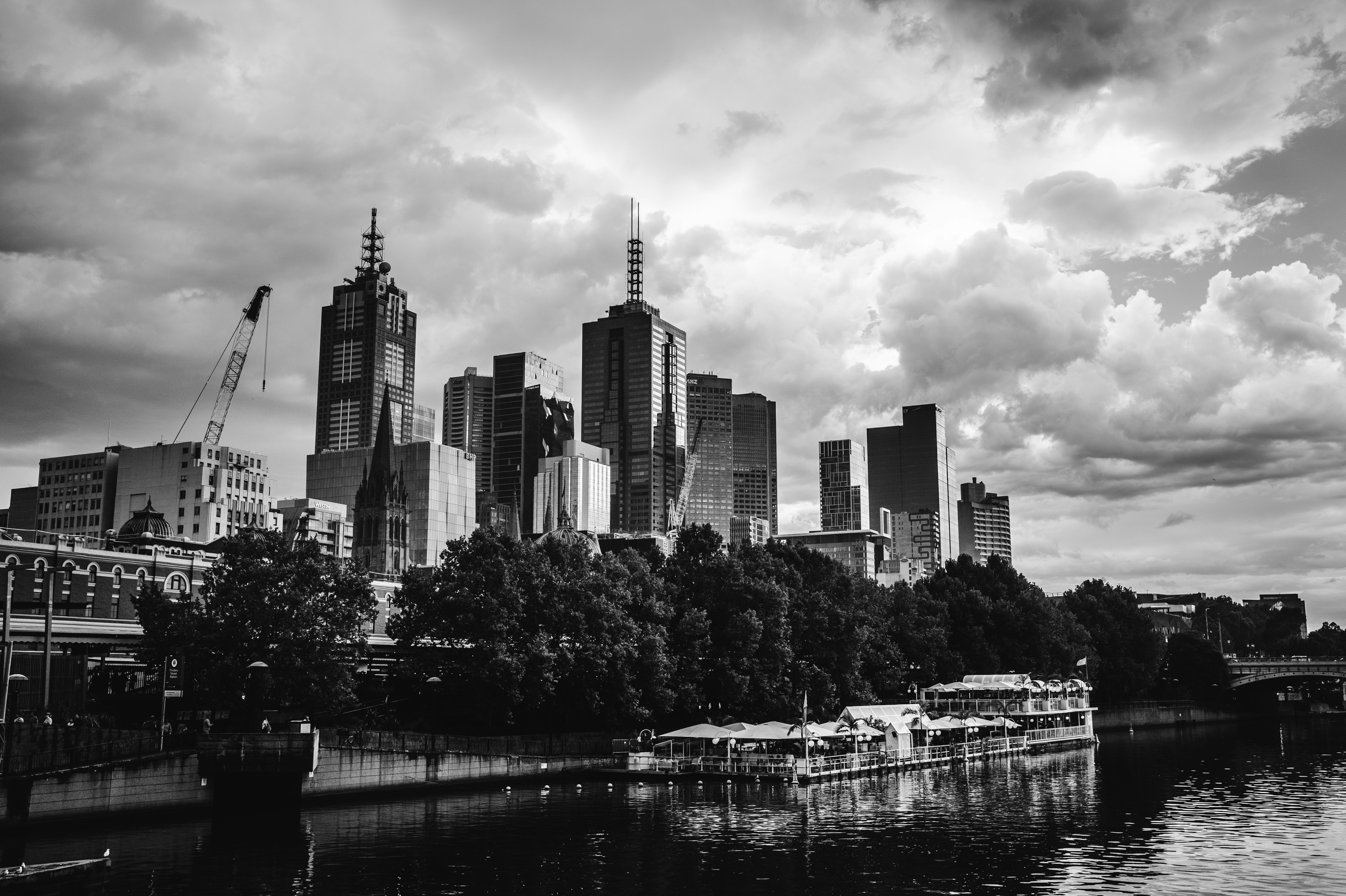 Gray Giants on the River: A Black-and-White Cityscape