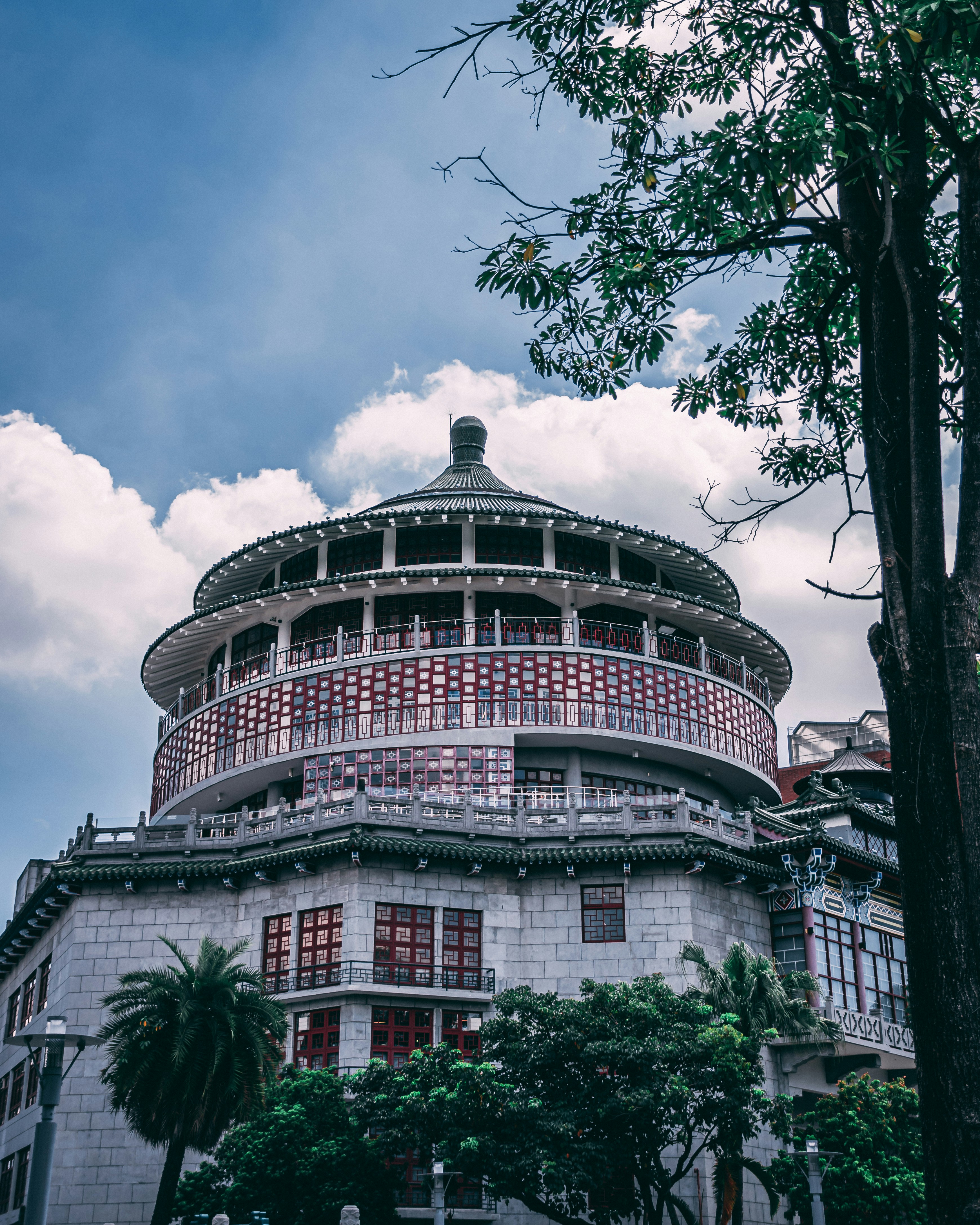 Circular Temple Tower Rising Above Colonial Facade