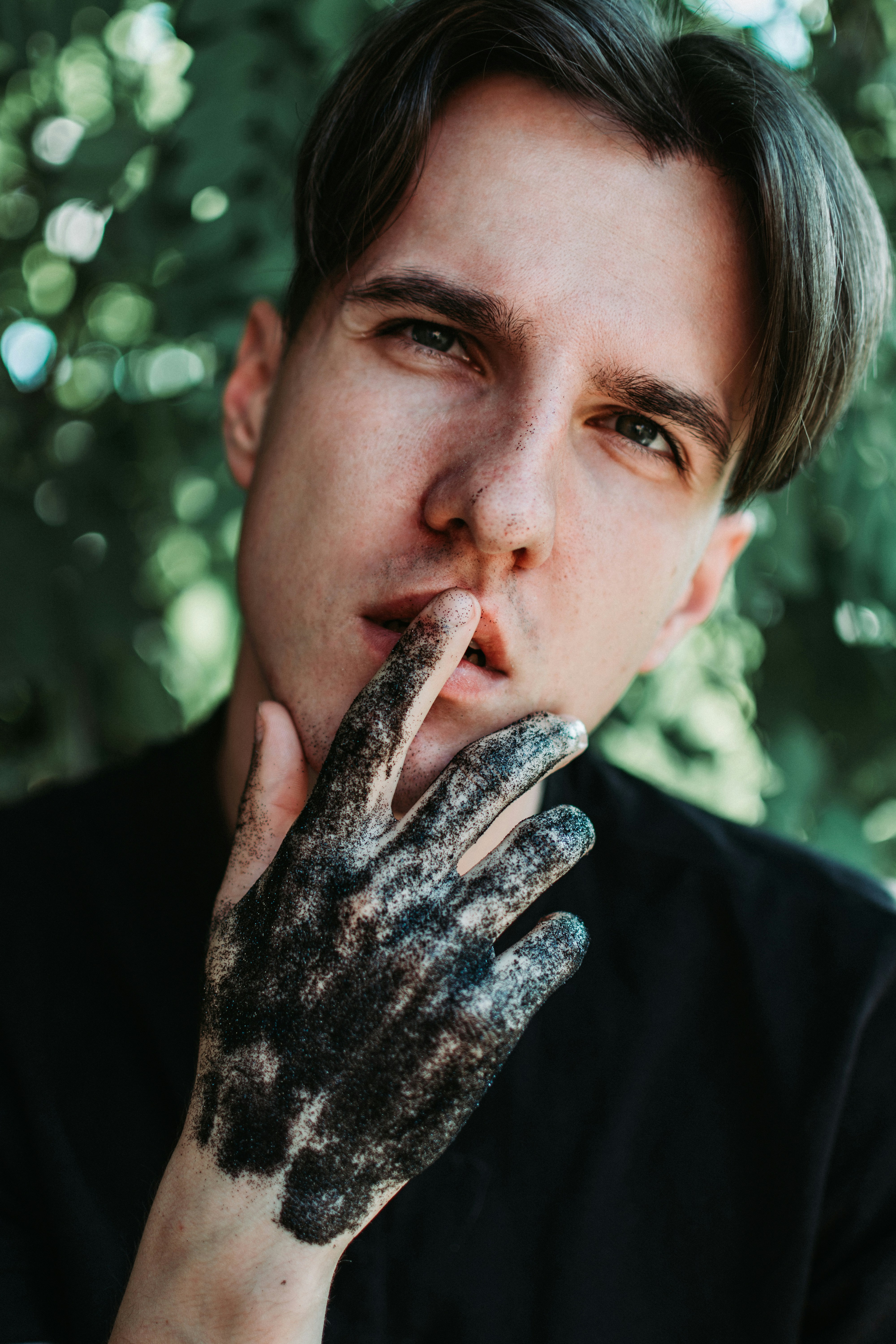 Charcoal Hand, Quiet Gaze: A Portrait in Green