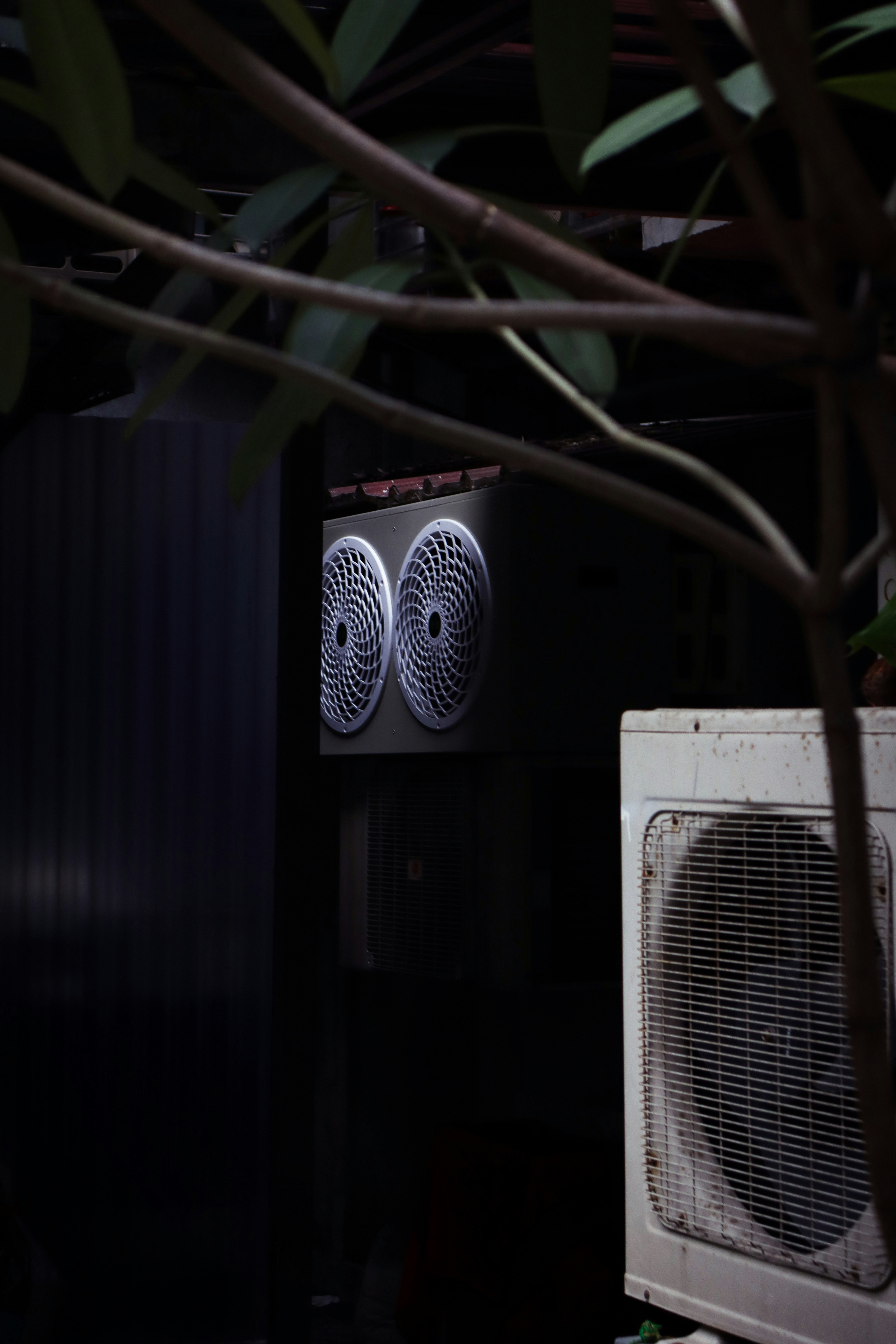 white and black window type ac unit