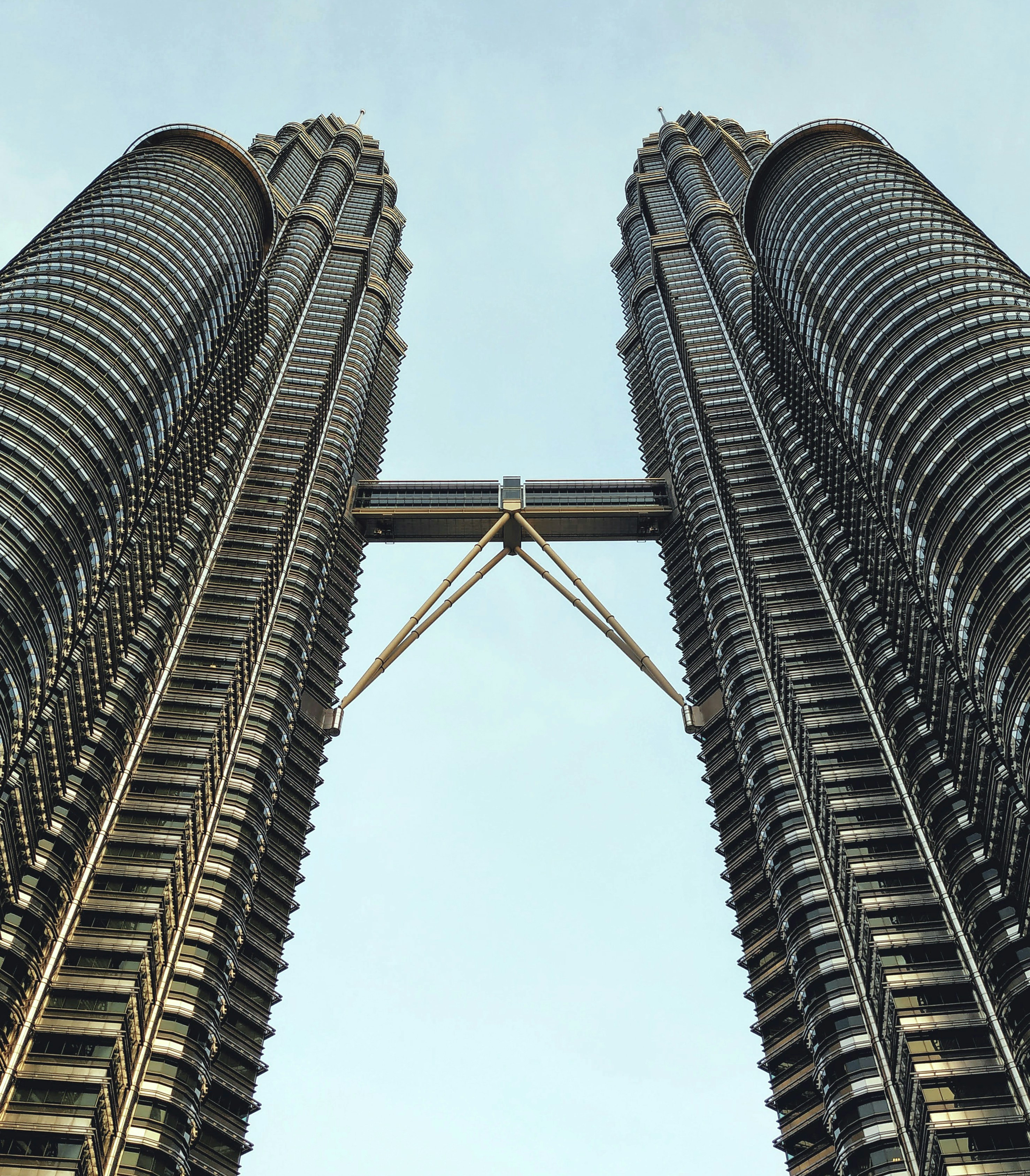 Low angle photography of gray high rise building photo – Free Petronas ...