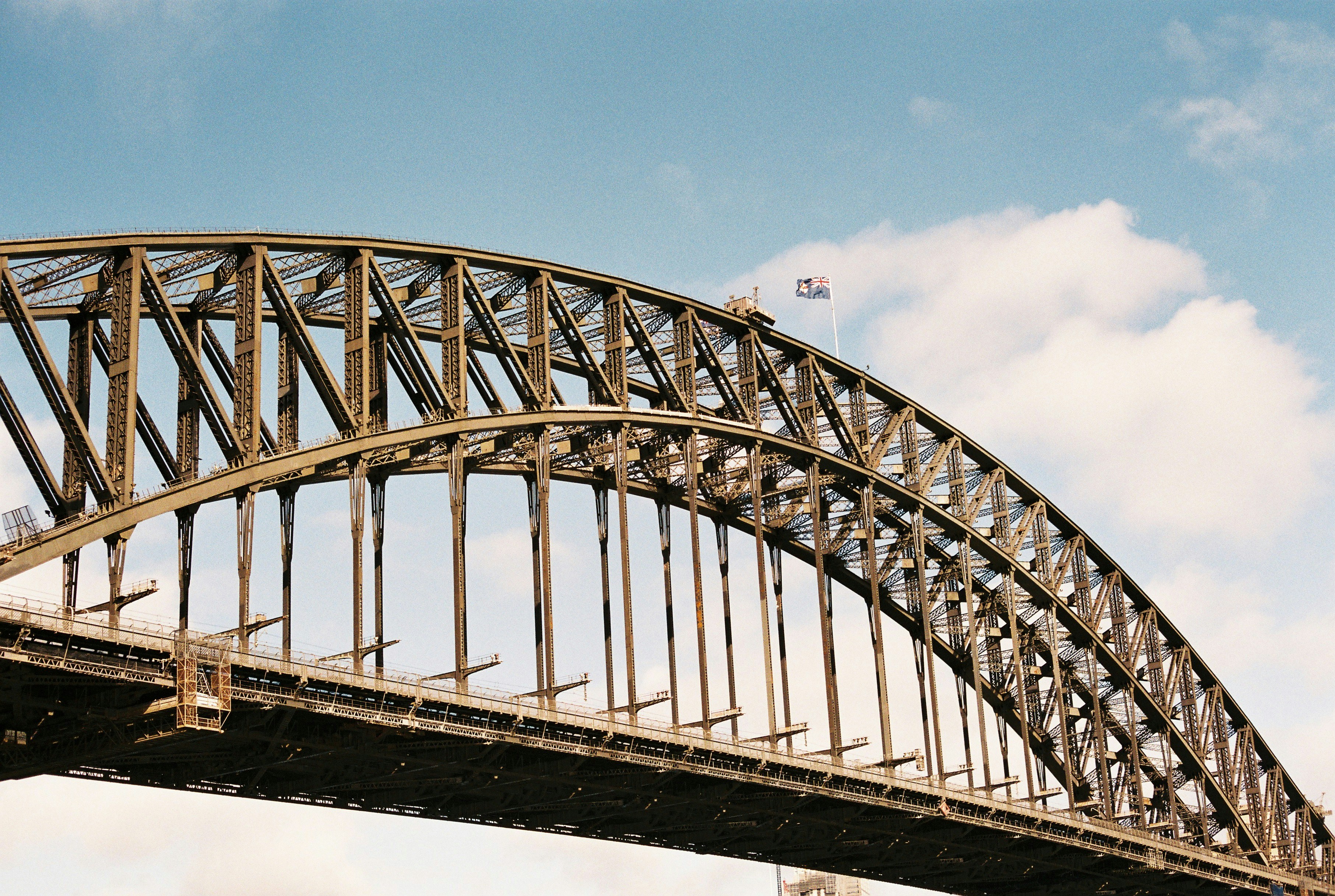 Crown of Steel: The Lattice Arch Reaching Toward a Blue Sky