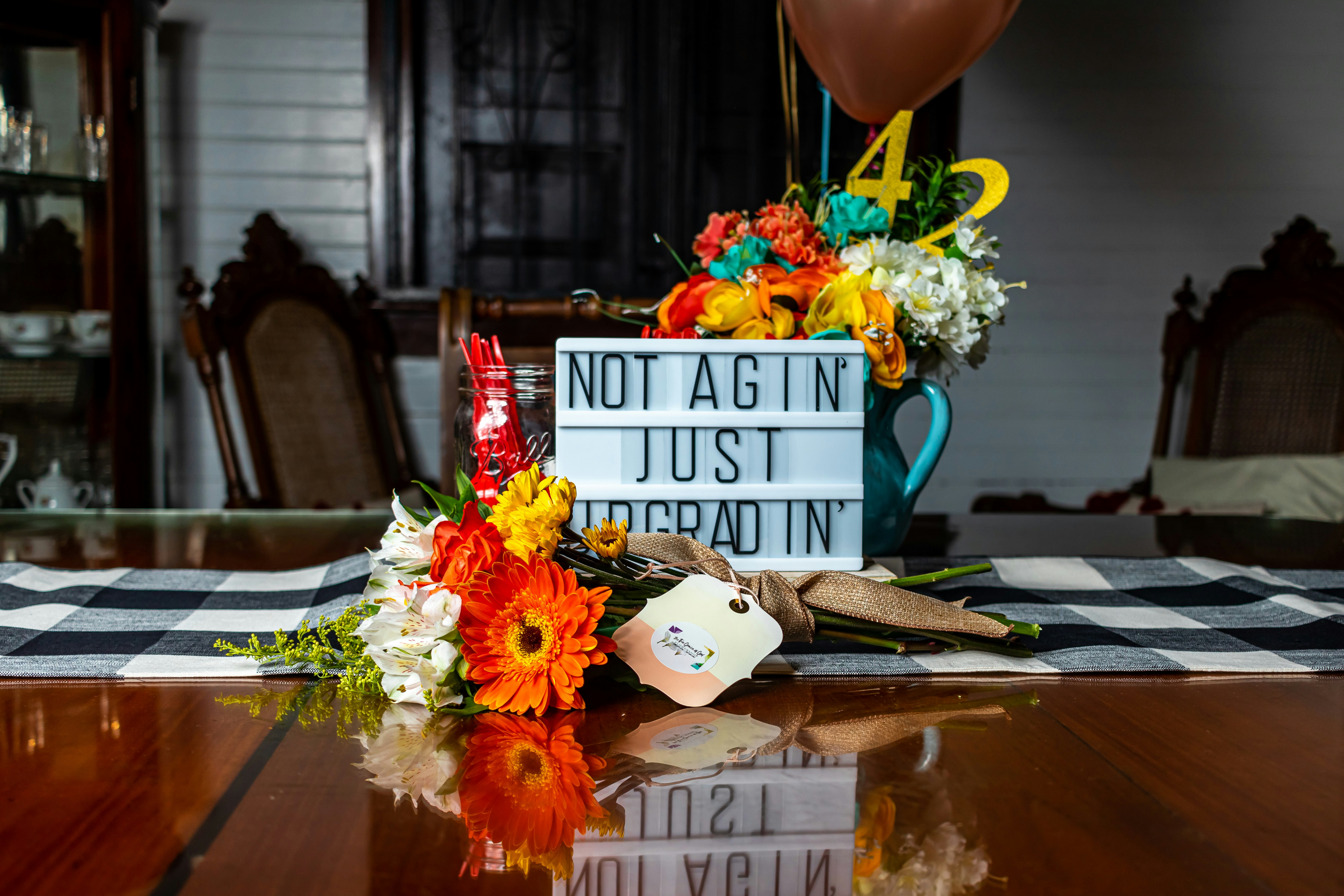 happy birthday greeting card on brown wooden table