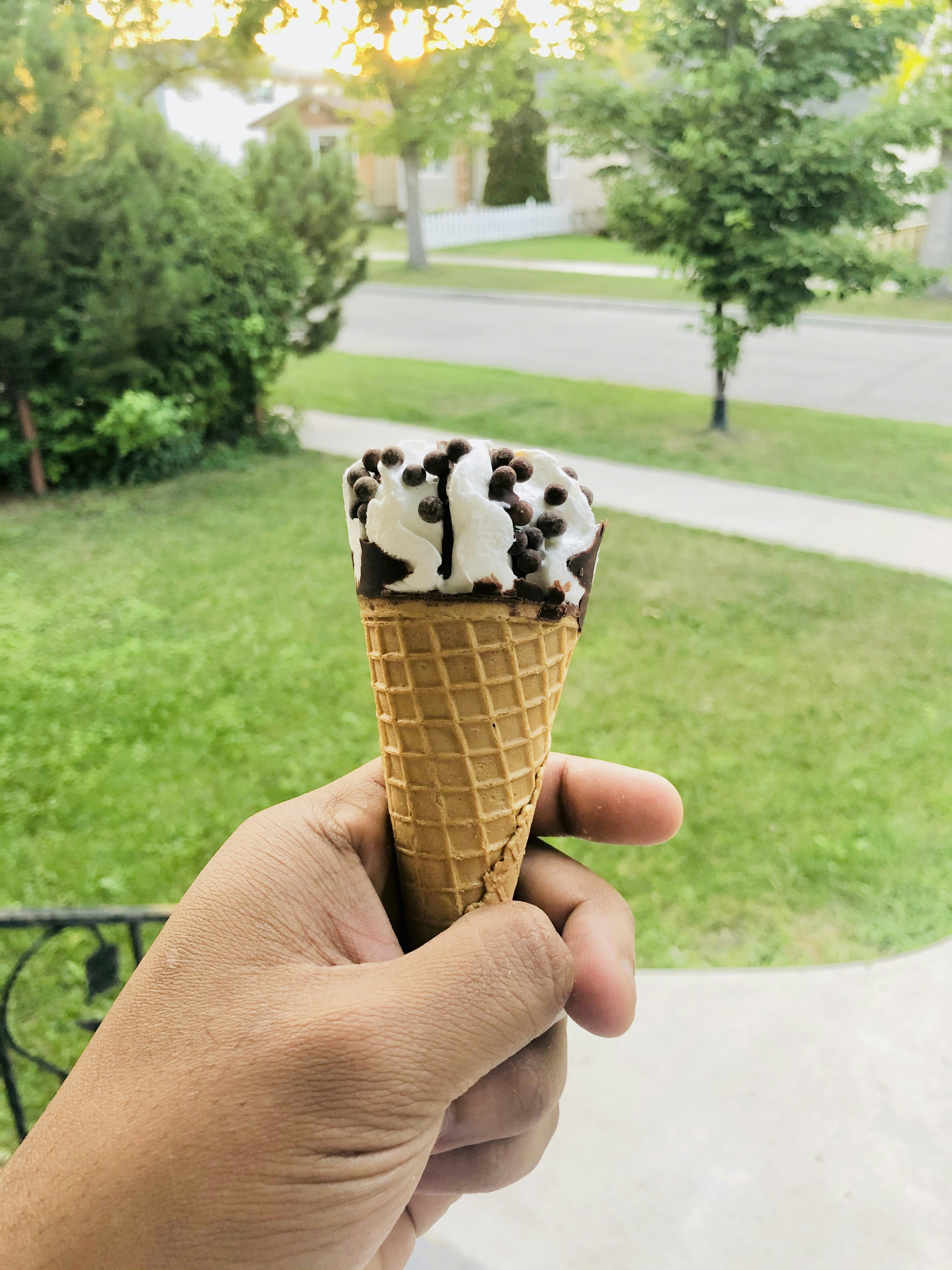 Porchlight Crunch: A Hand-Held Vanilla Cone with Cookie Bits