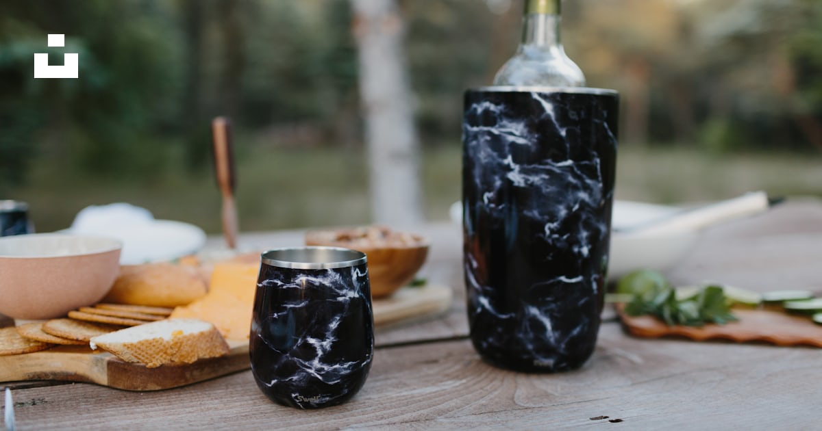 Black Glass Bottle Beside Bread On Brown Wooden Table Photo Free Grey