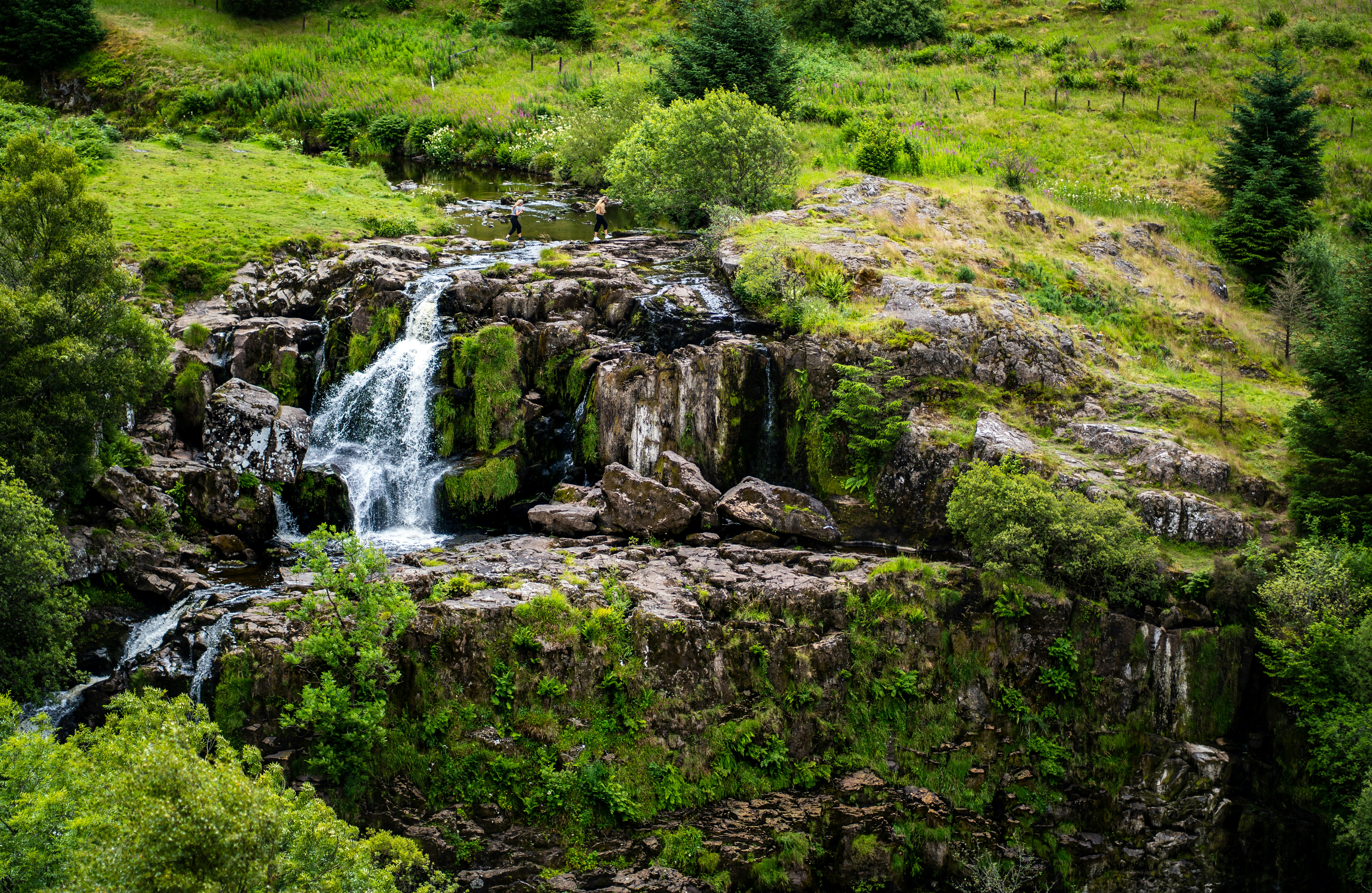 Waterfalls on green grass field during daytime photo – Free Land Image ...