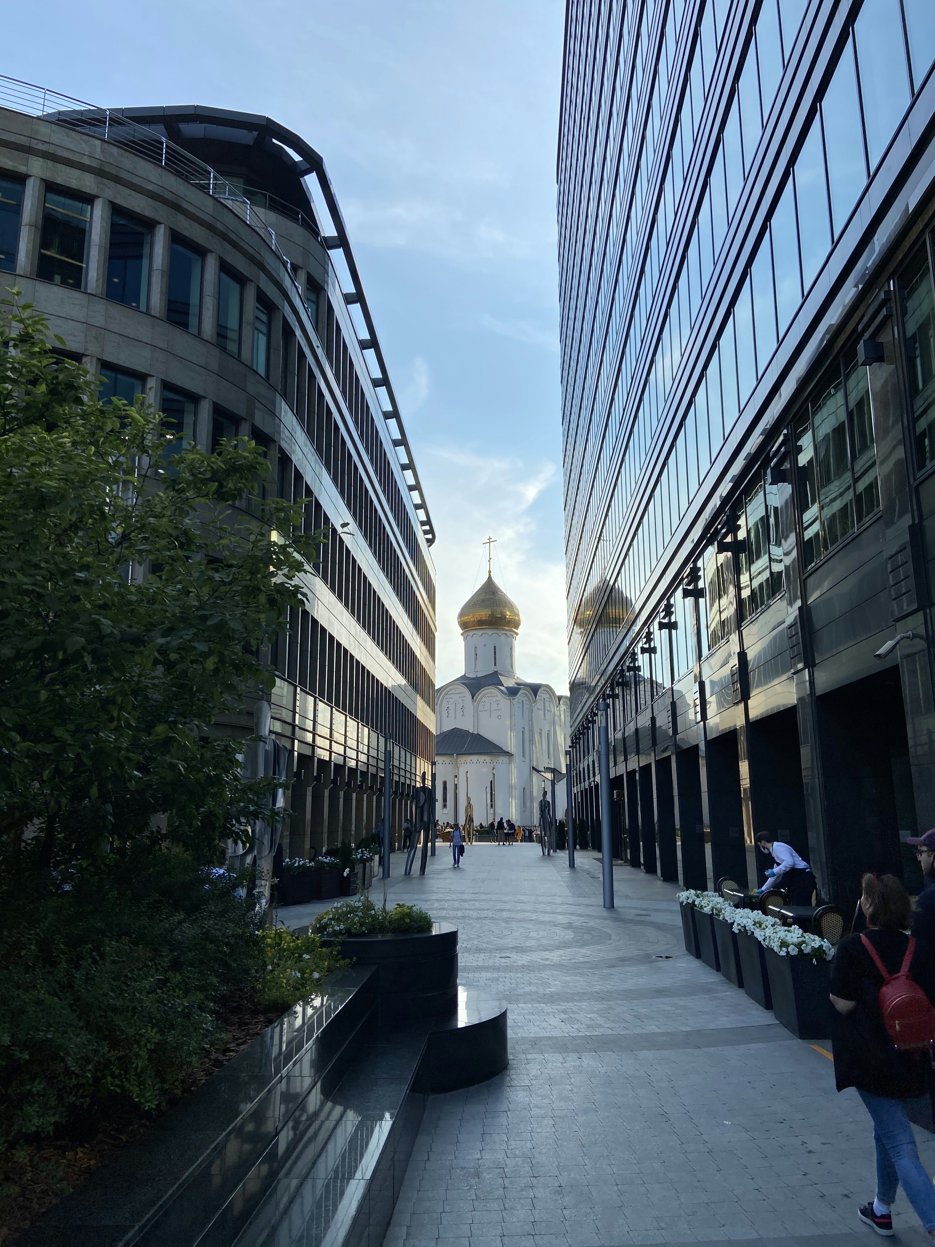Golden Domes at the End of a Glass Corridor