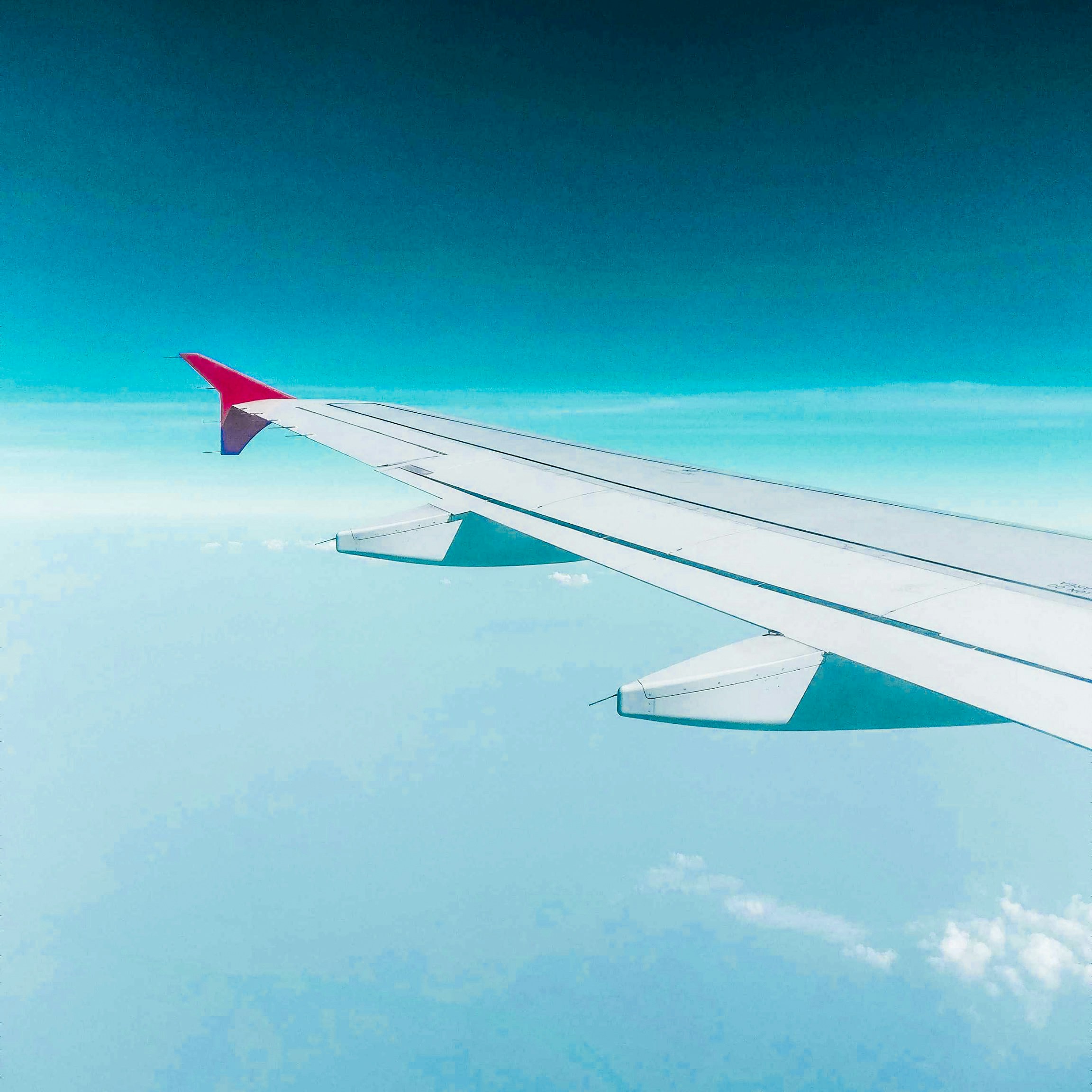 White and red airplane wing under blue sky during daytime photo – Free ...
