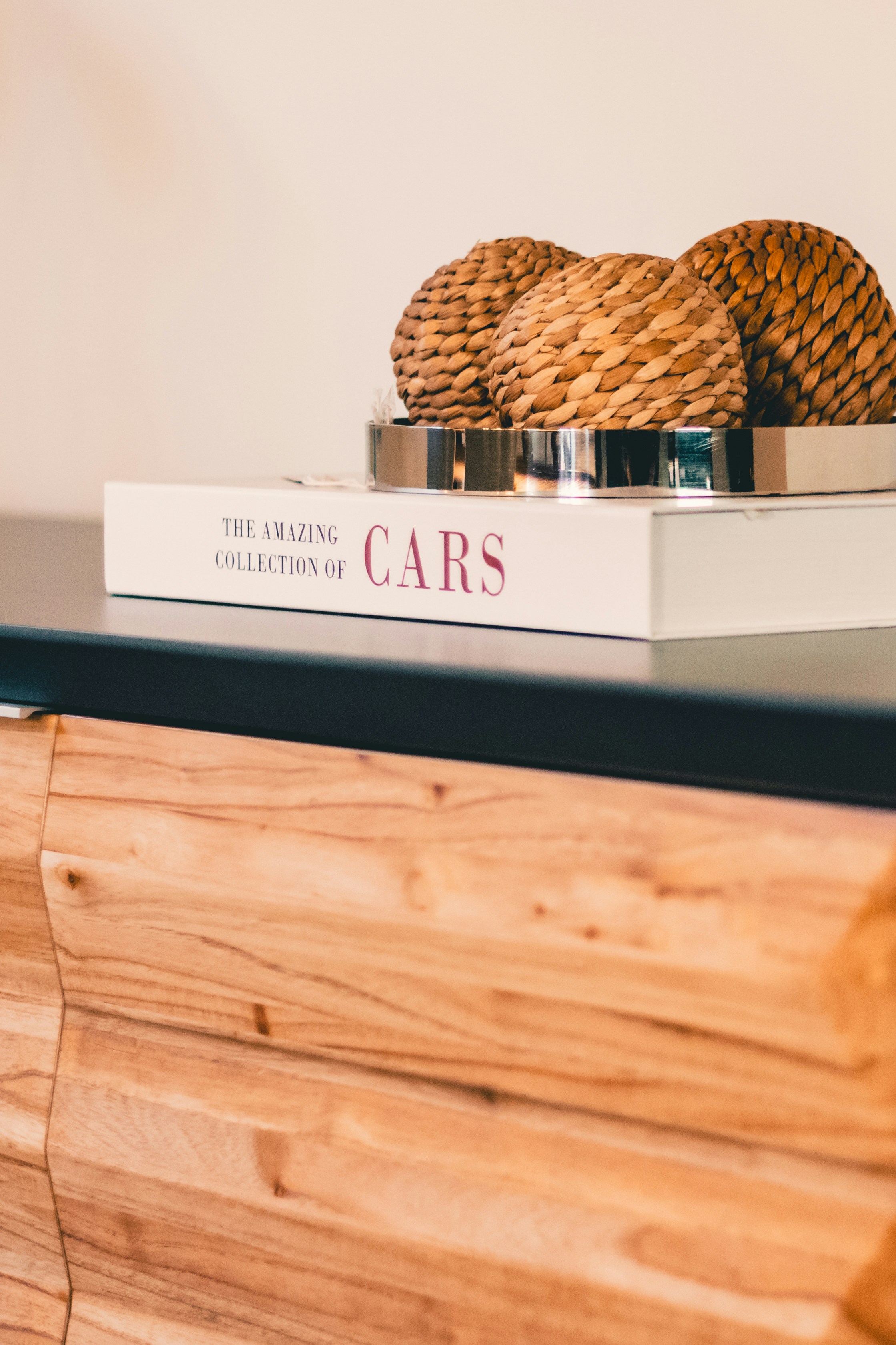 Pinecones on a Car Book: A Quiet Still-Life Moment