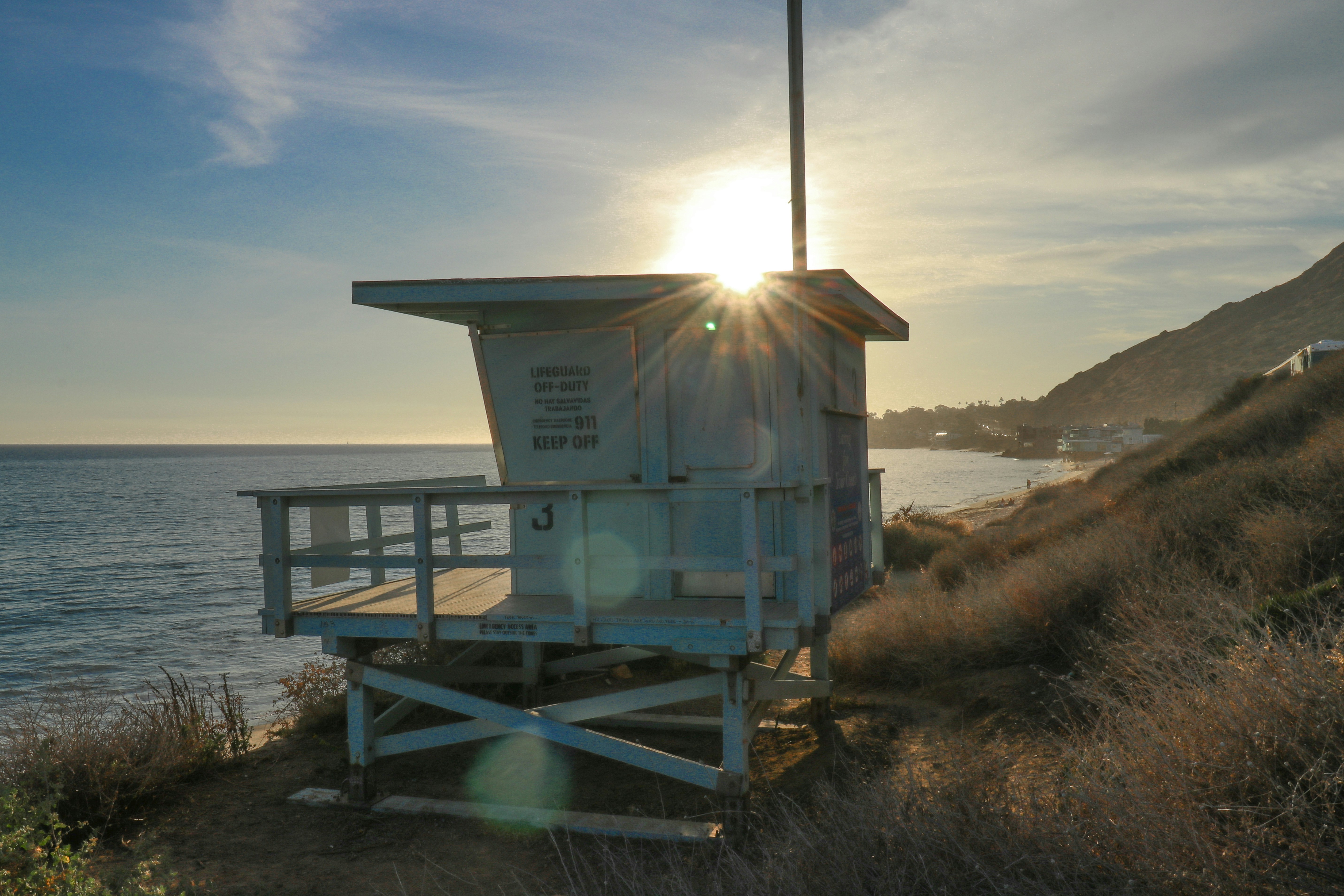 White wooden lifeguard house on seashore during daytime photo – Free ...