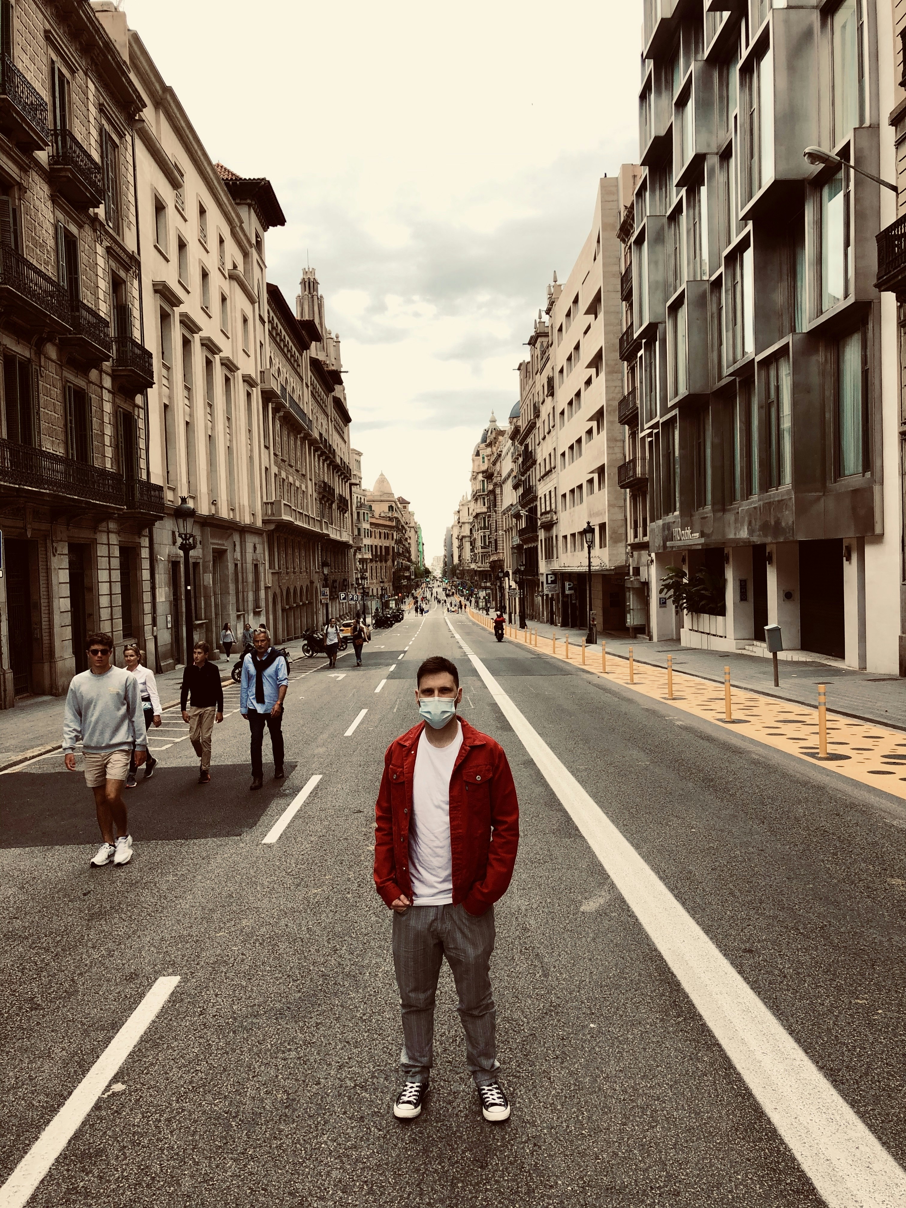 People walking on street between buildings during daytime photo – Free ...