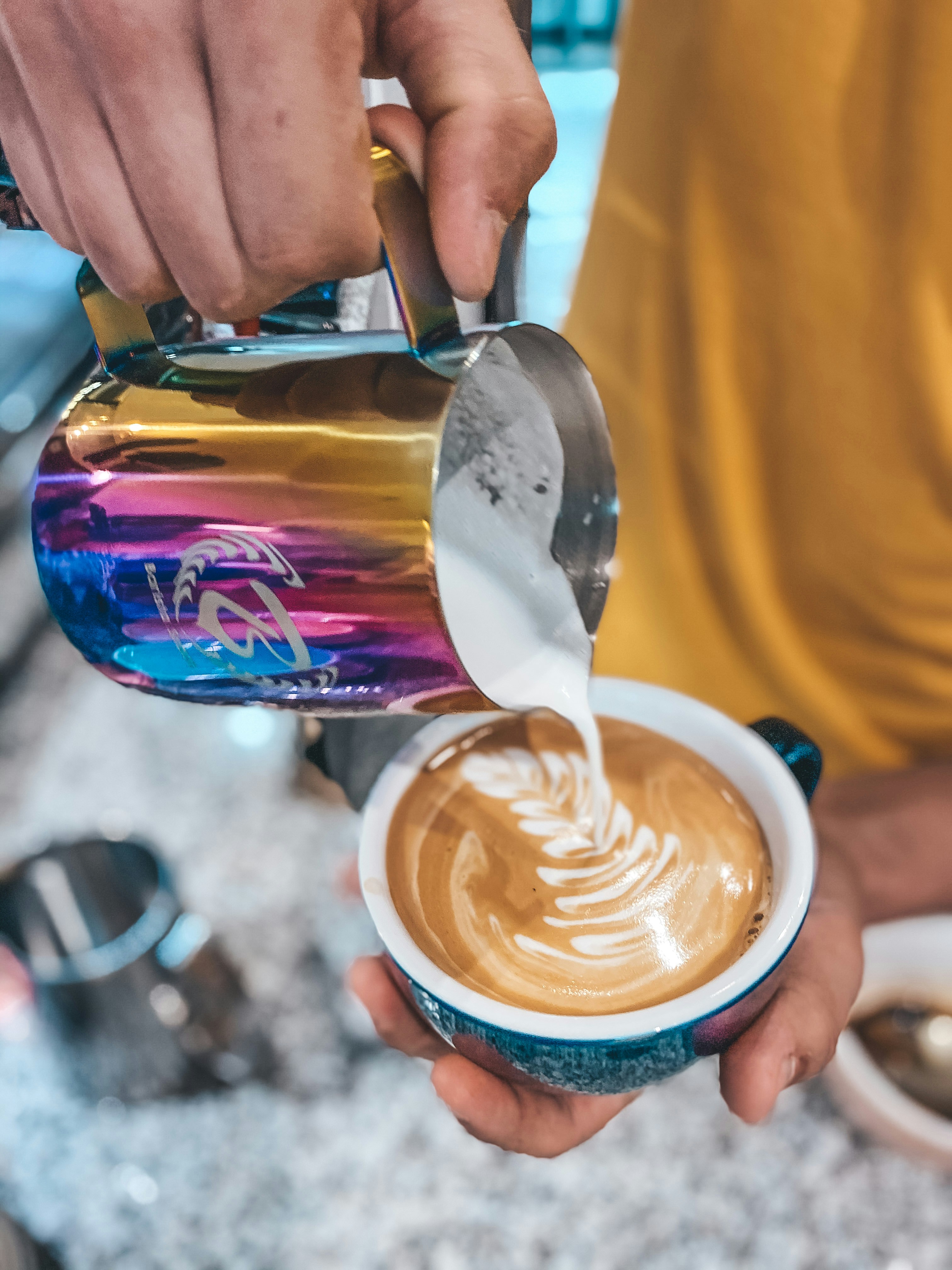 Prismatic Pour: Rainbow Pitcher Delivers Latte Art in Motion