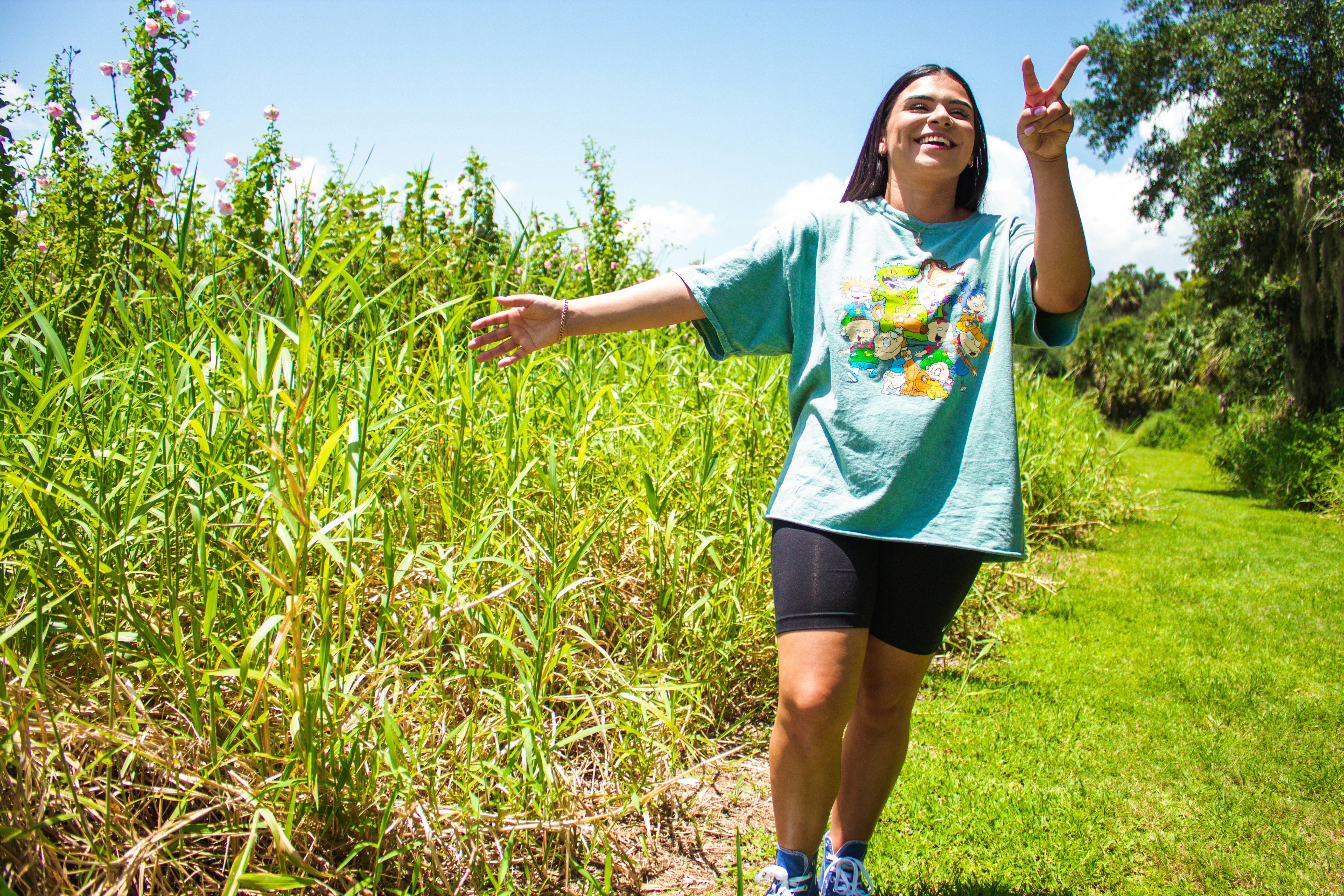 Joyful Peace in the Cornfield: A Sunny Portrait with Peace Sign