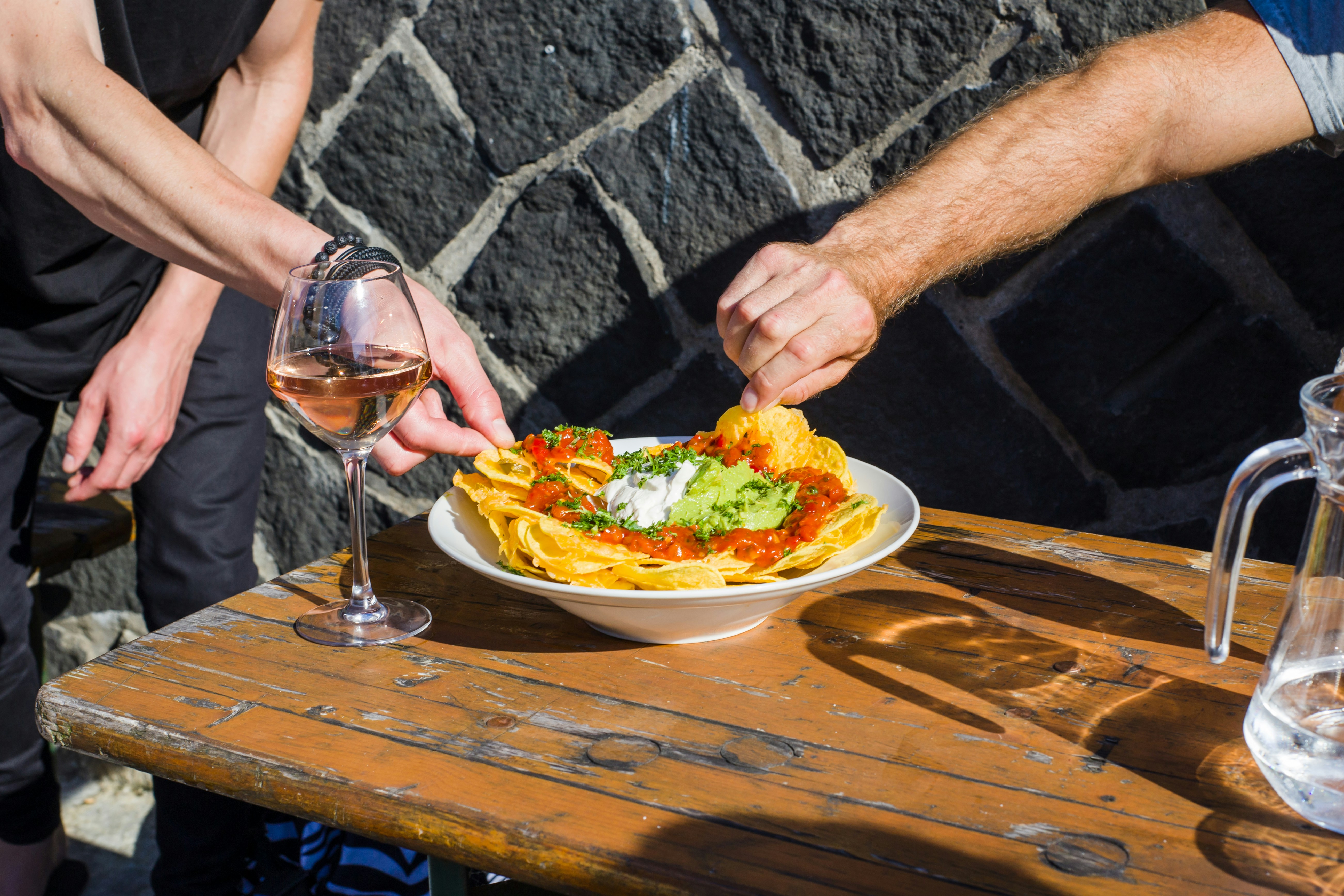 Sunlit Snack Break by the Stone Wall