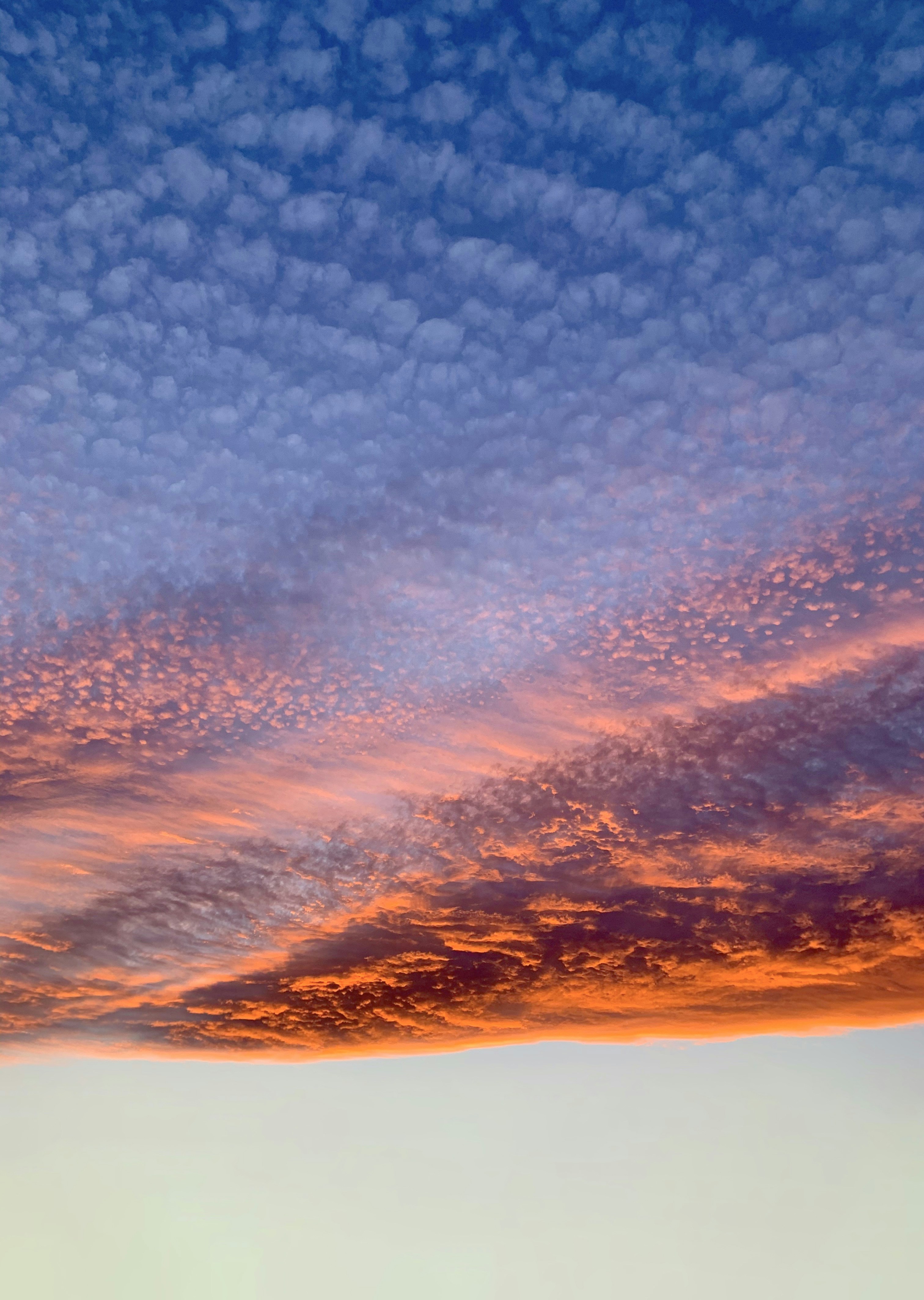 Crimson Currents Across a Velvet Sky at Dusk