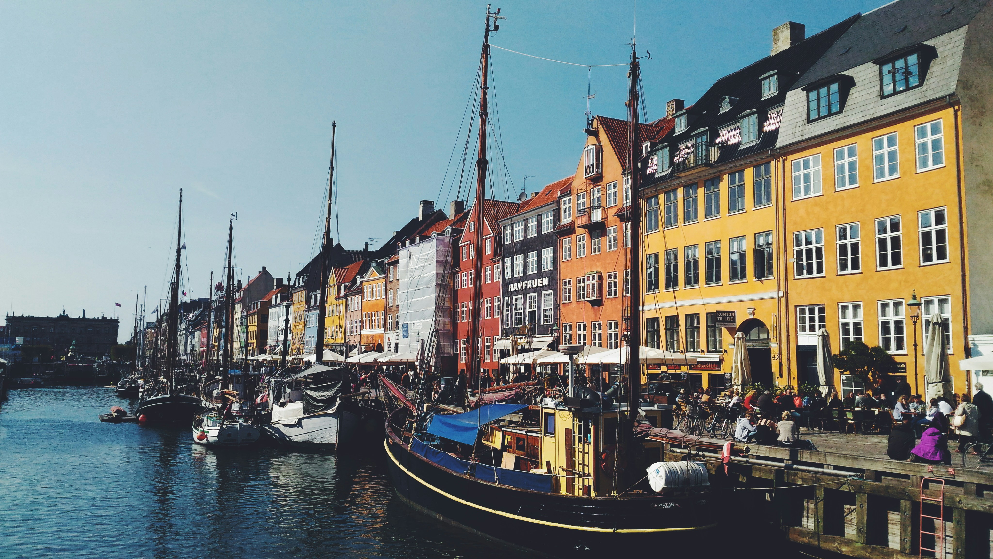 Boat on dock near buildings during daytime photo – Free Denmark Image ...
