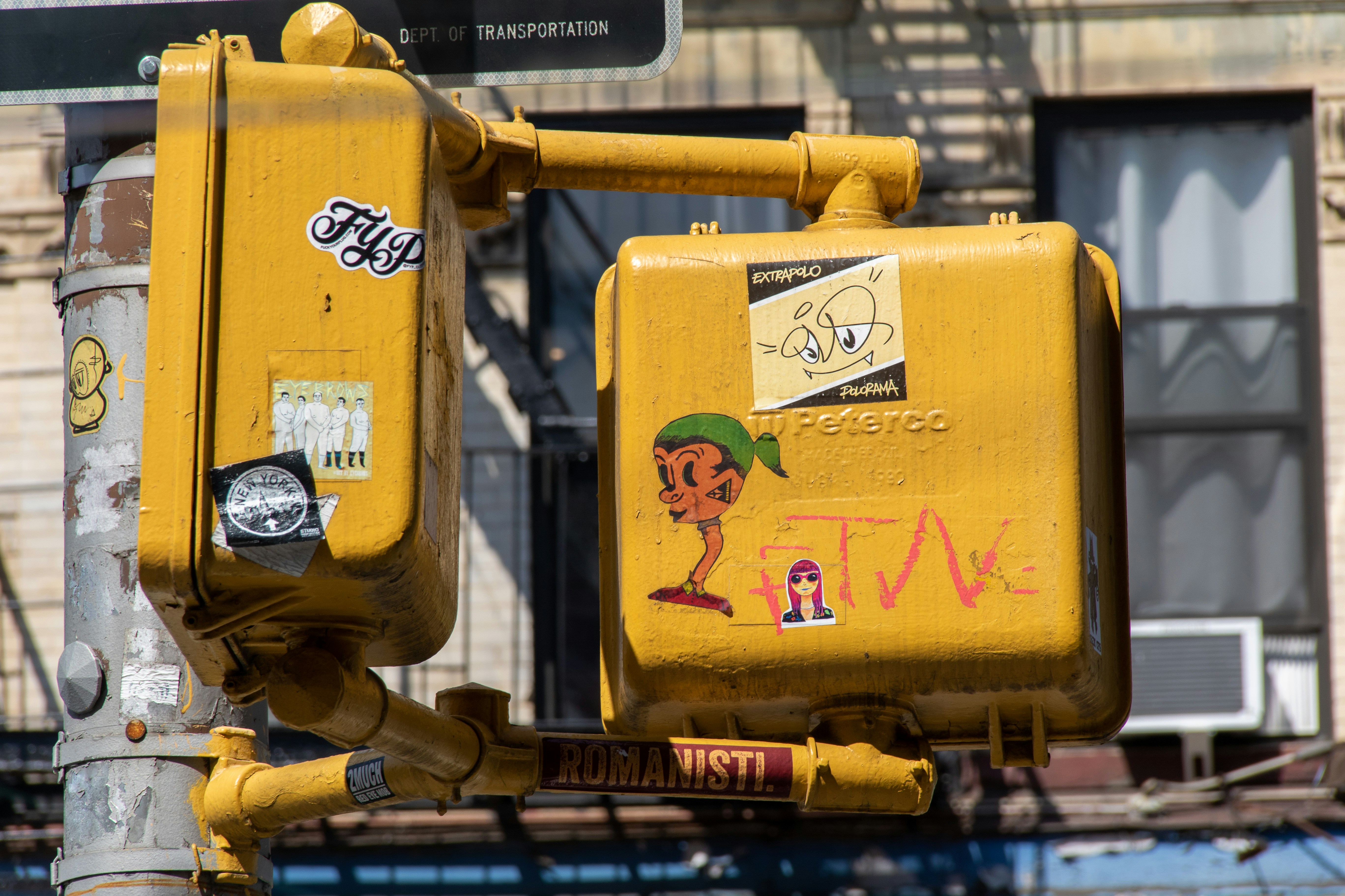 Stickered Yellow: A City Utility Box as a Graffiti Gallery