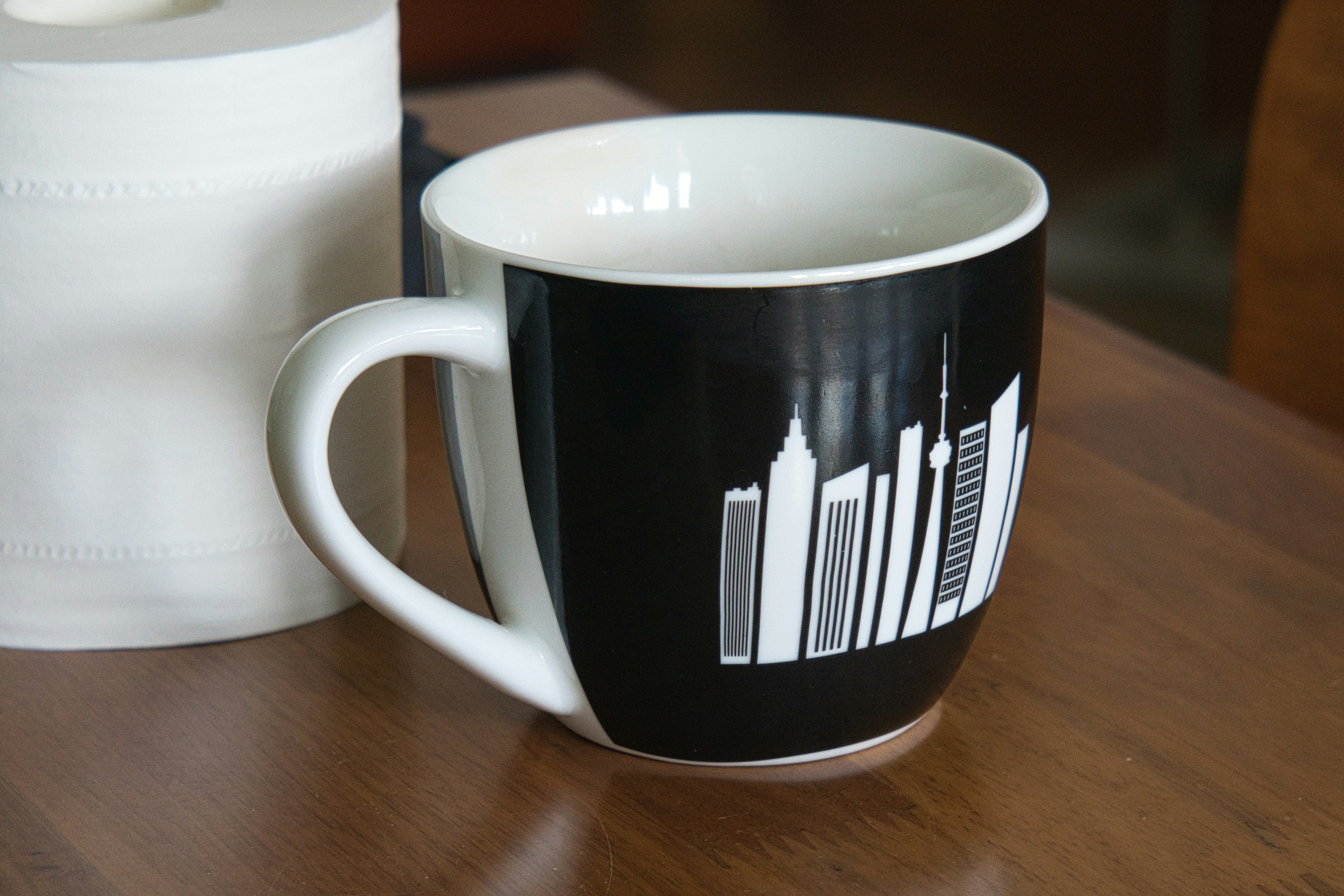 Mug Orbit: White Skyline on a Dark Cup