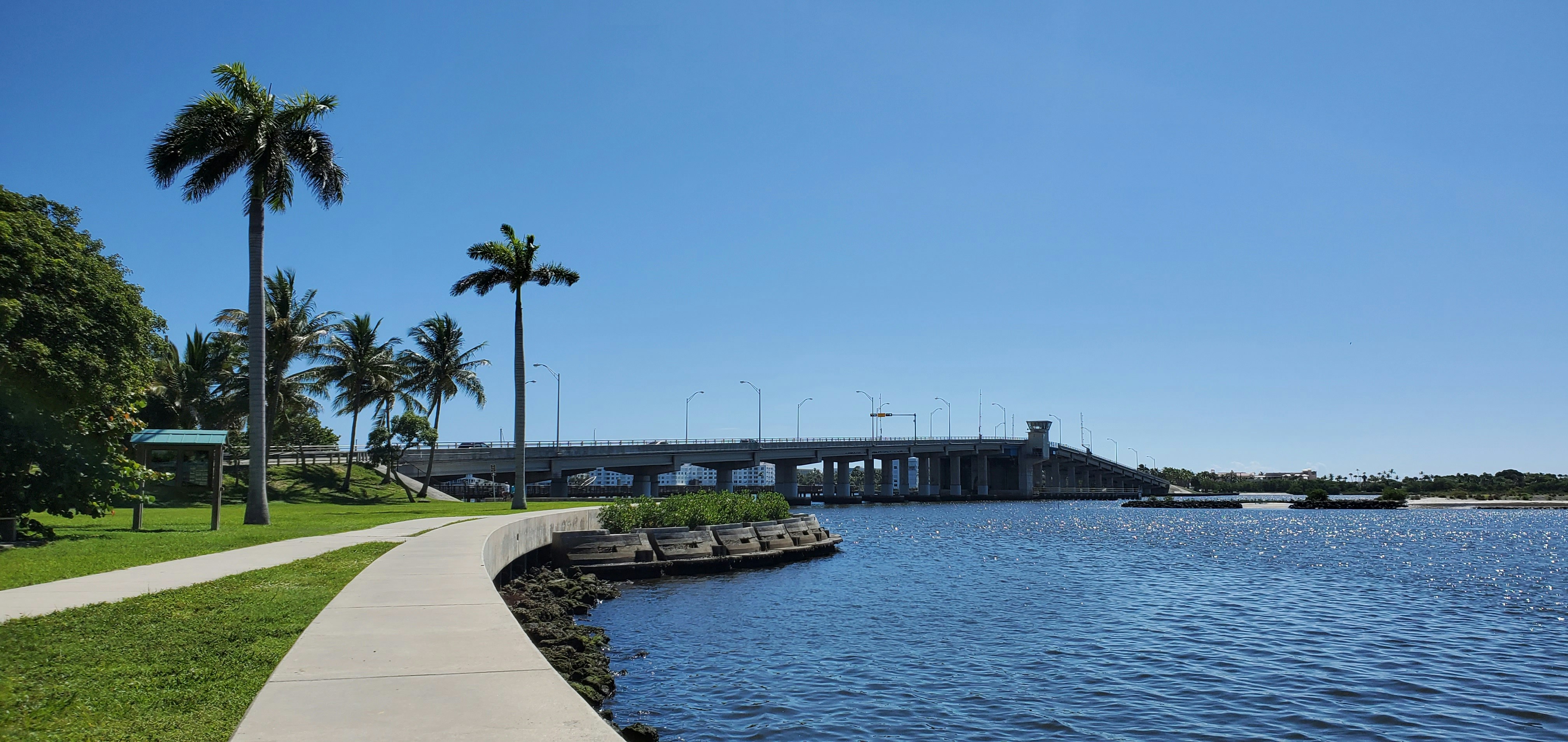 Gray concrete bridge over river during daytime photo – Free Water Image ...