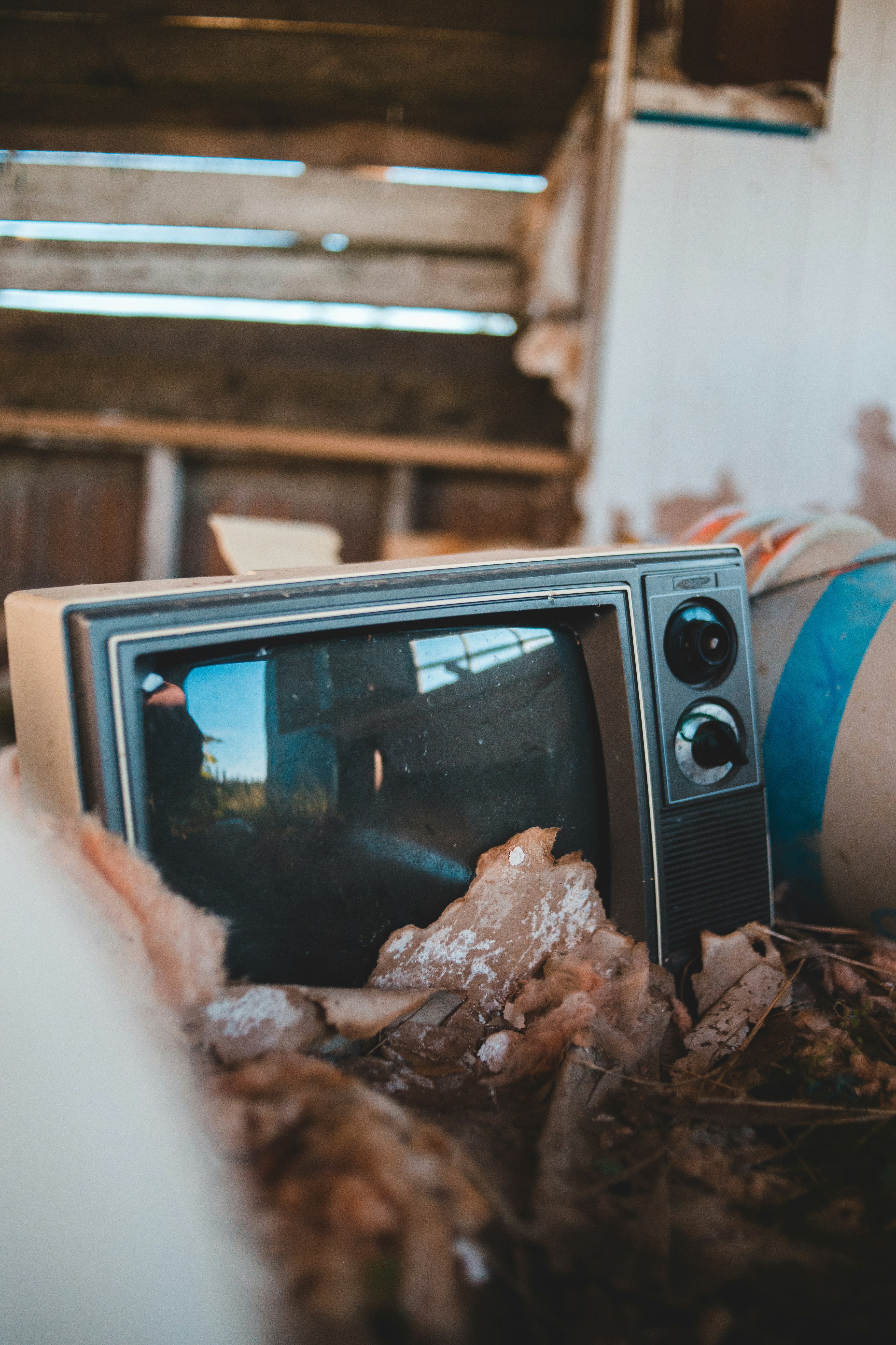 Dusty Vintage TV Buried in Leaf-Littered Shed
