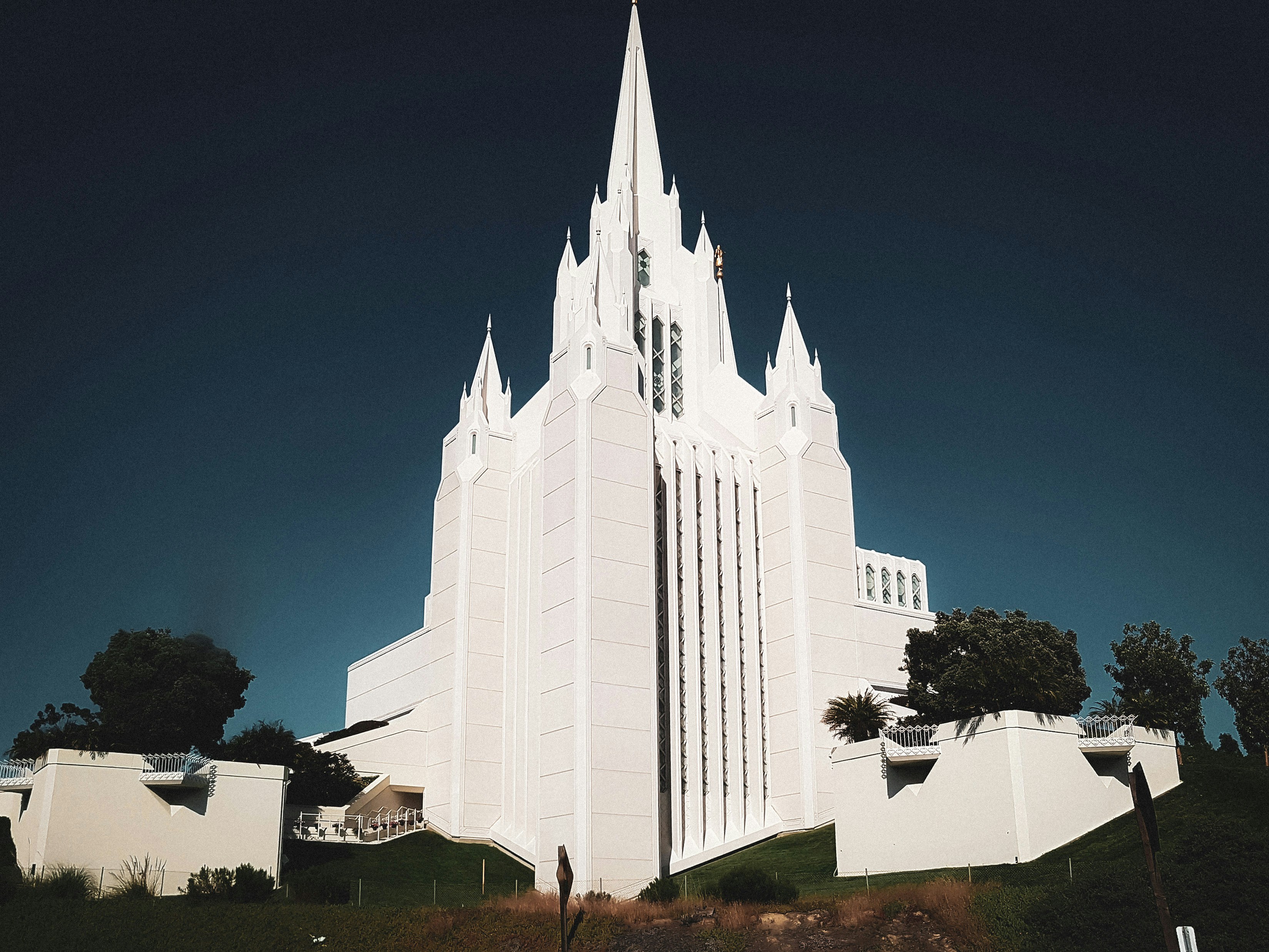Apex of White Spires Beneath a Velvet Evening Sky