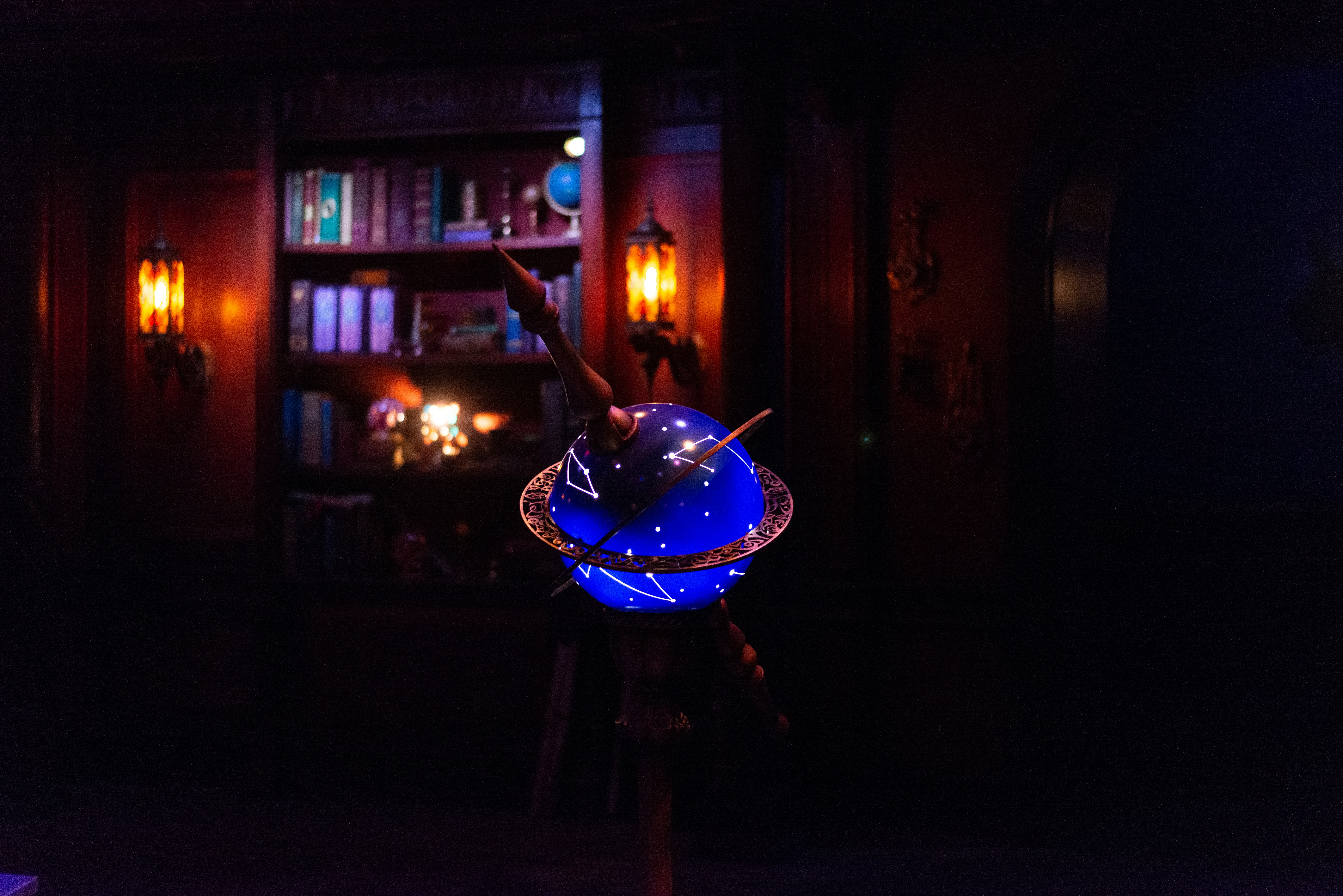 Orbital Oddity: A Cheery Blue Planet in a Dim Library
