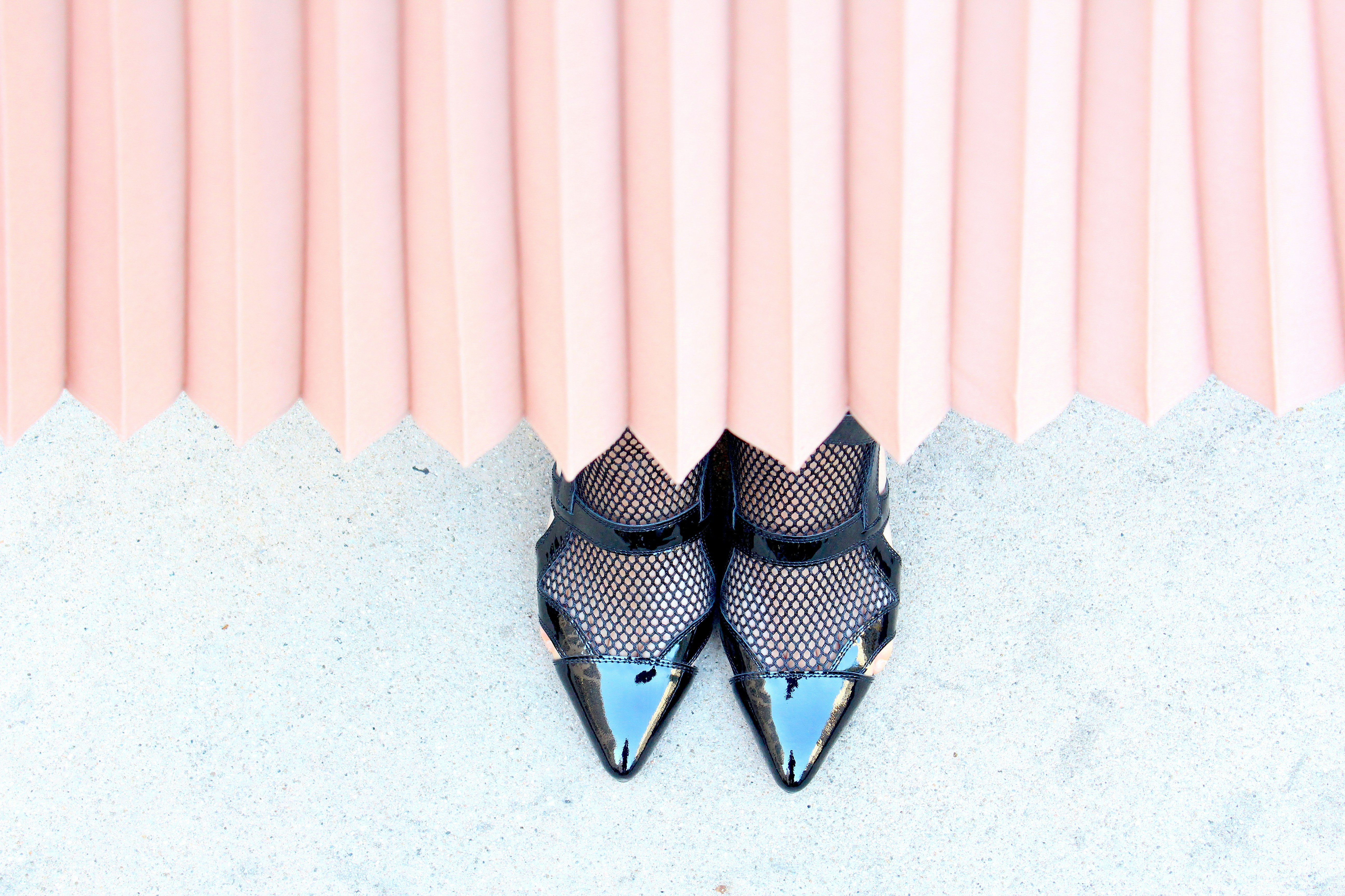 Shadowed Steps: Pointed Flats and a Peek of Straps