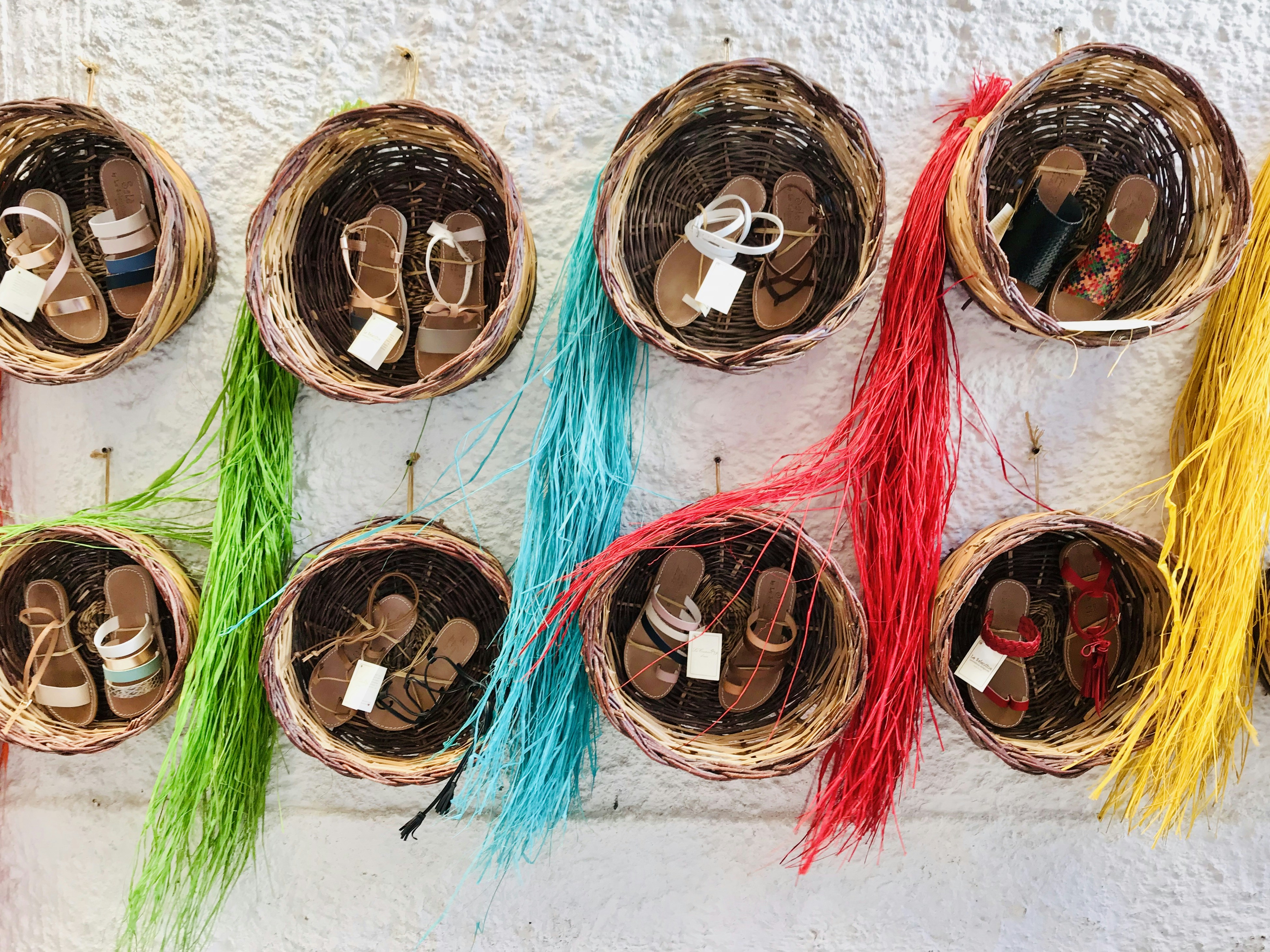 Neon Threads Framing a Row of Wicker Baskets