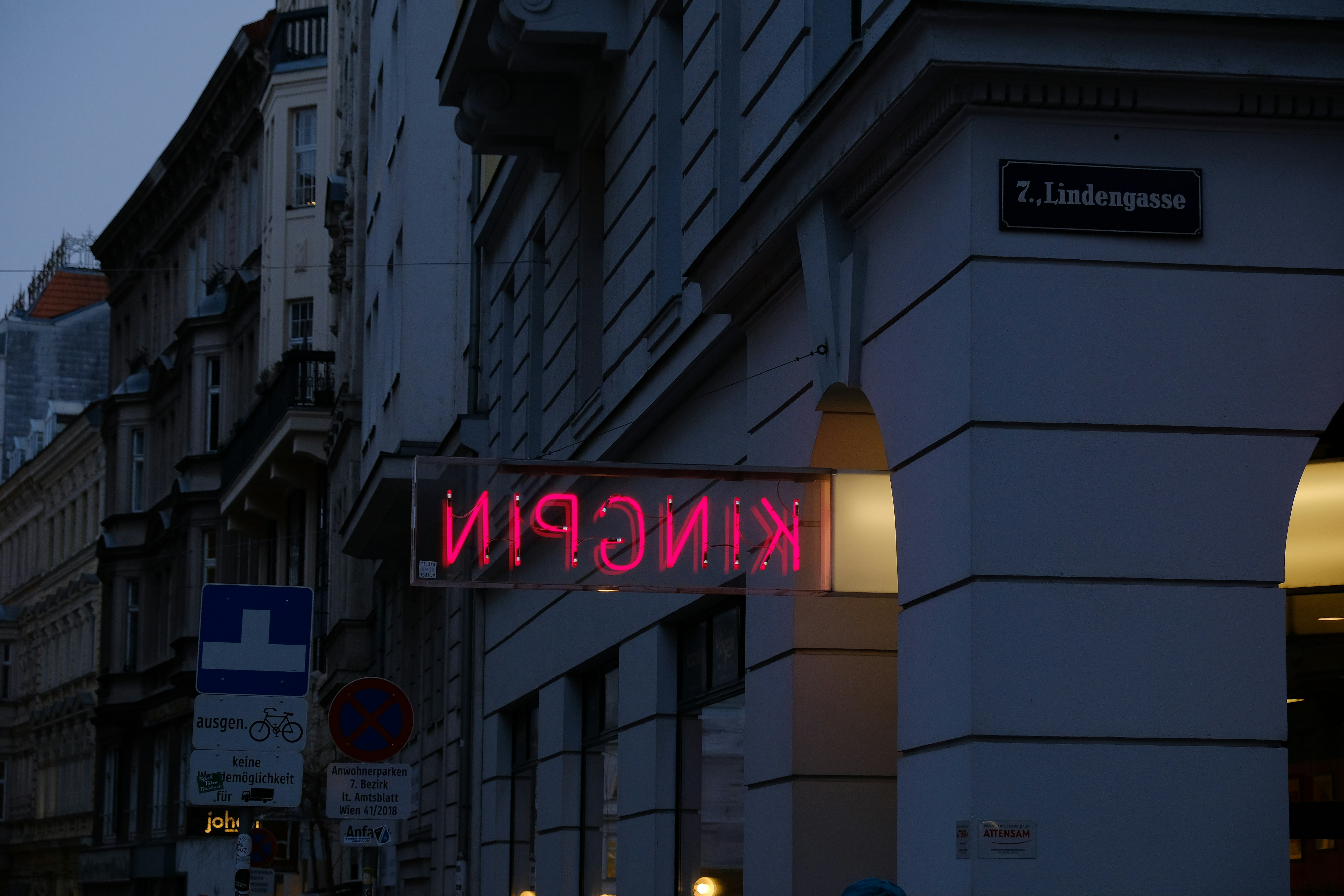 Lindengasse Neon: Magenta Reflections on a Viennese Corner