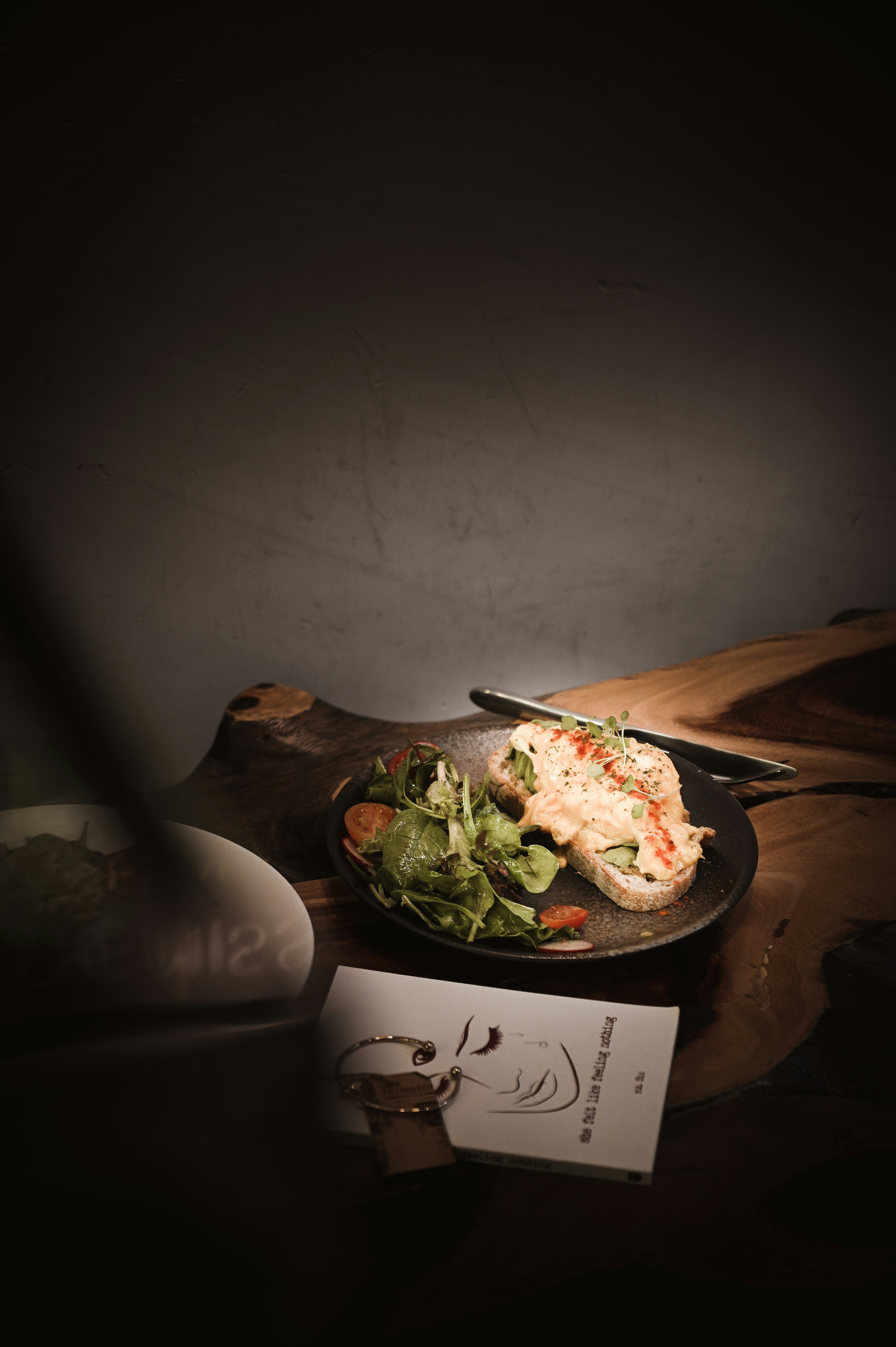 Dim Corner Bistro: Greens and Crust on a Weathered Board