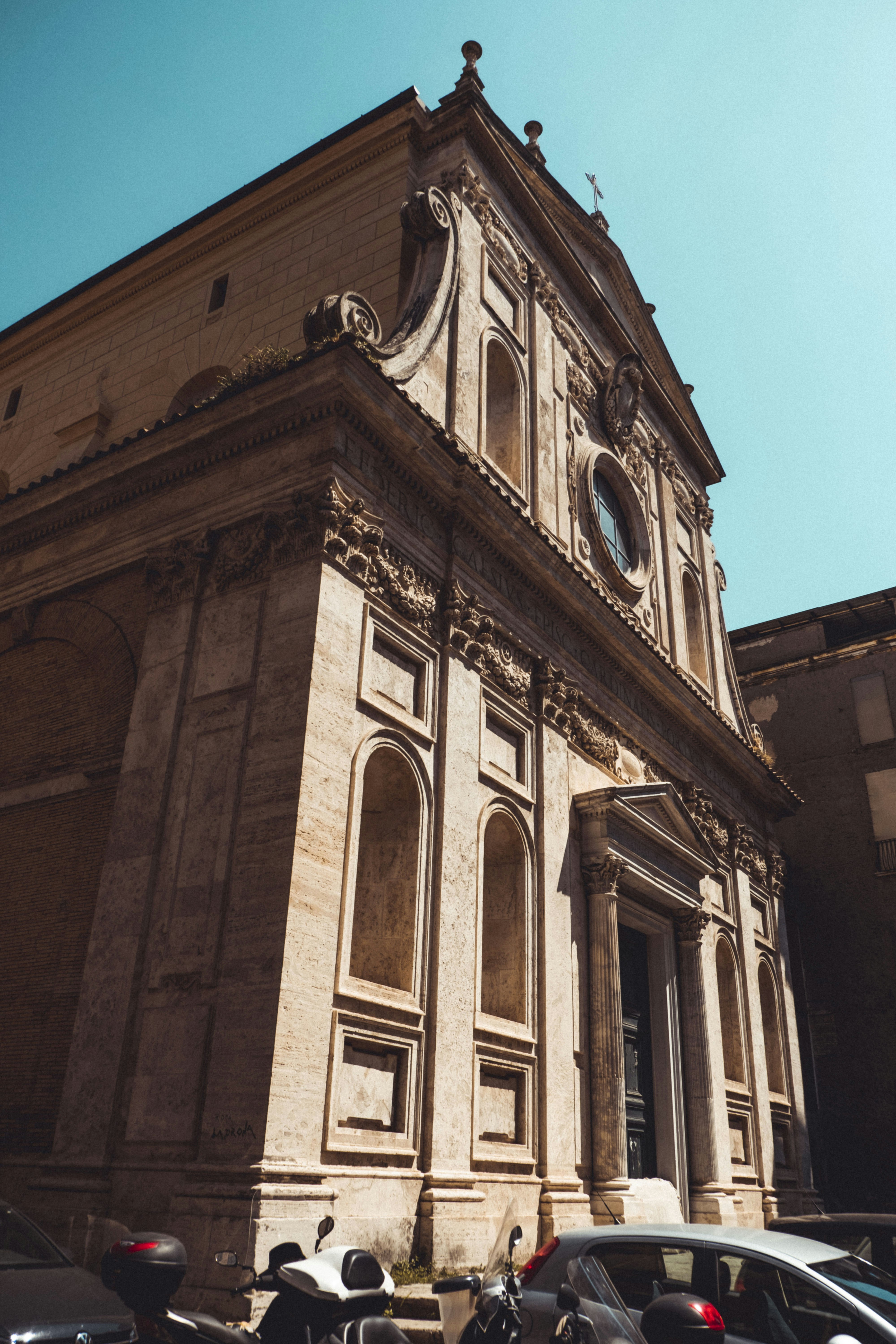 brown concrete building under blue sky during daytime