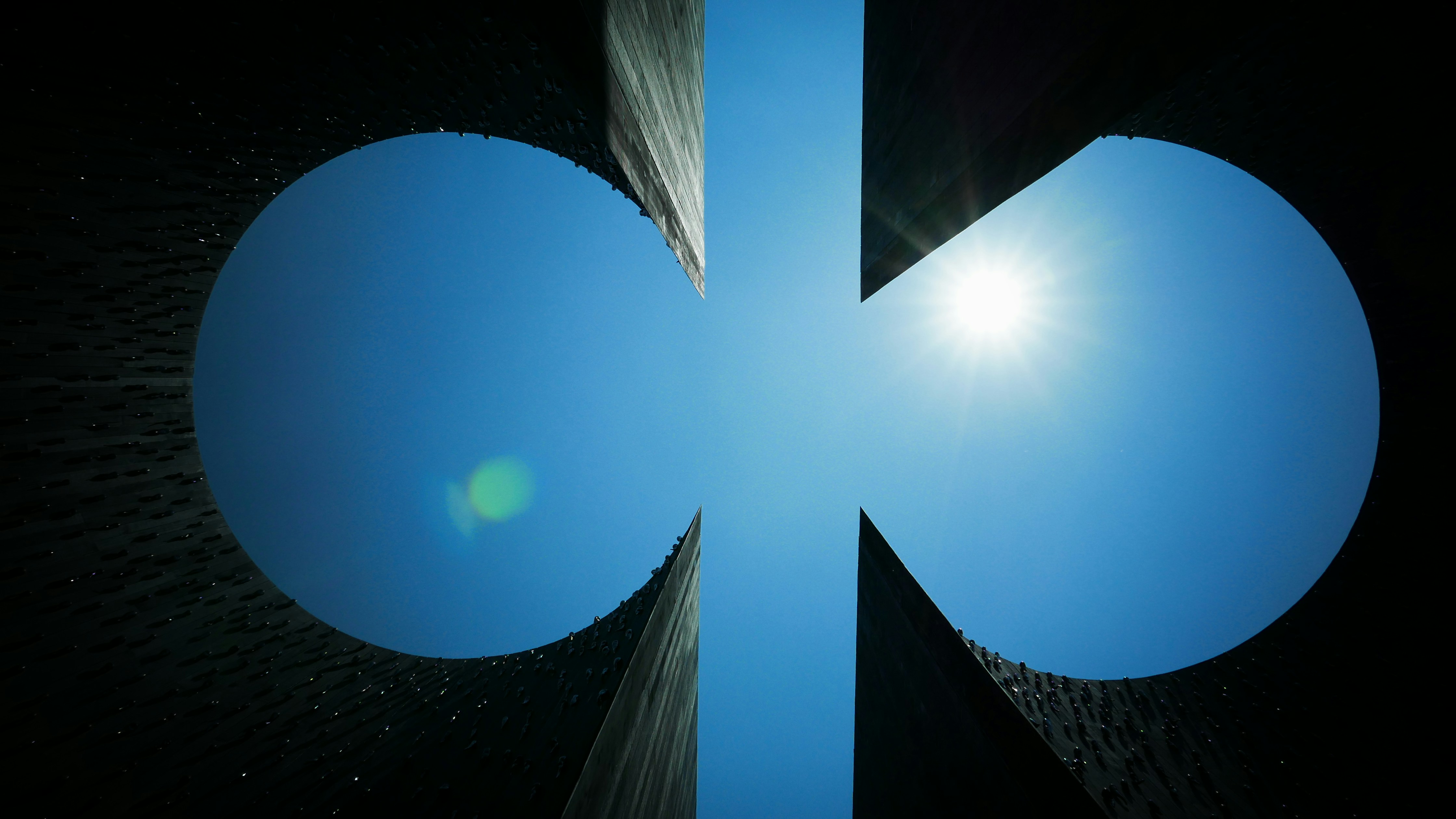 In Absence by Yhonnie Scarce and Edition Office 2019 | low angle photography of high rise building