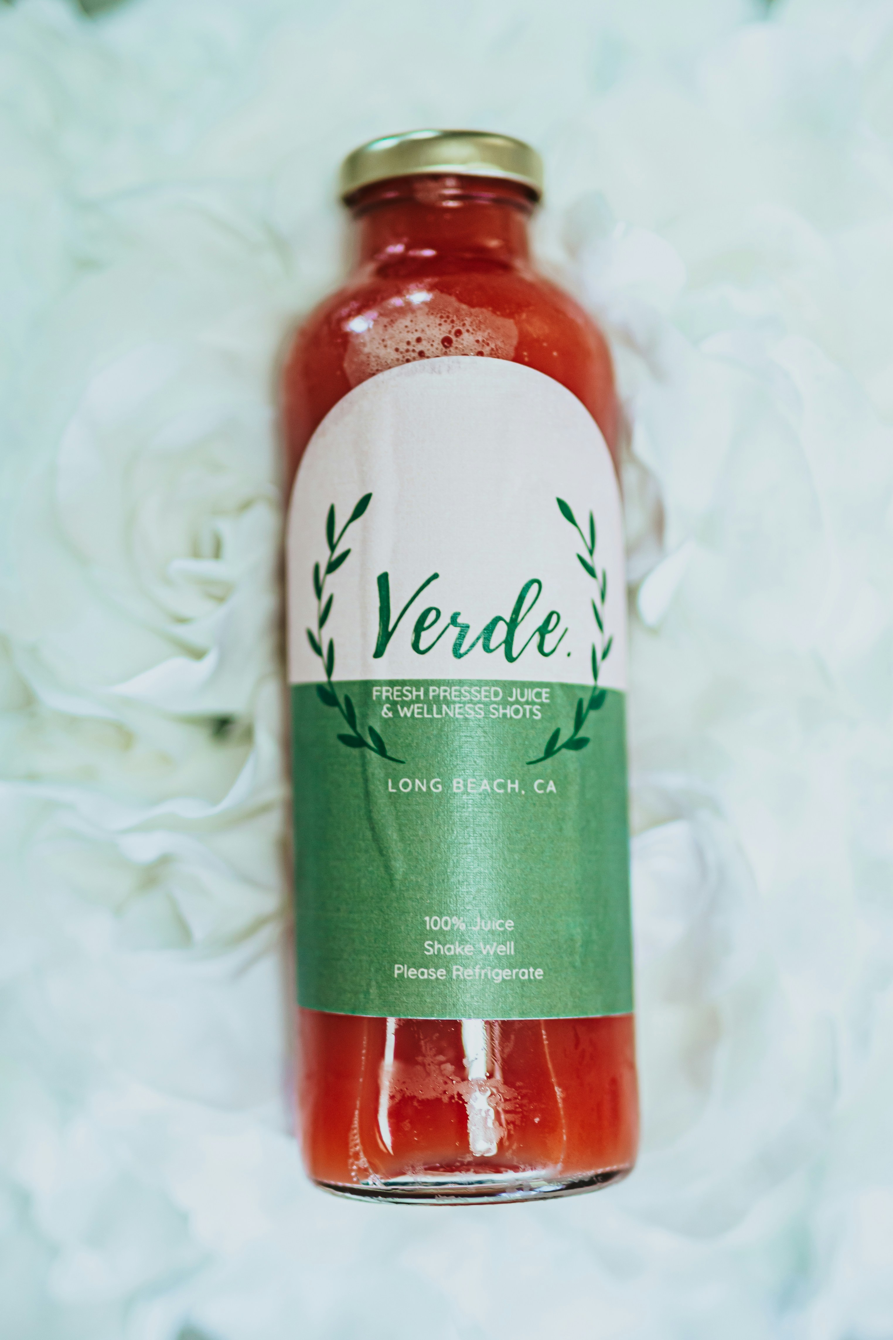 Verde Fresh Juice Bottle: Emerald Label on a Bottled Cocktail of Wellness
