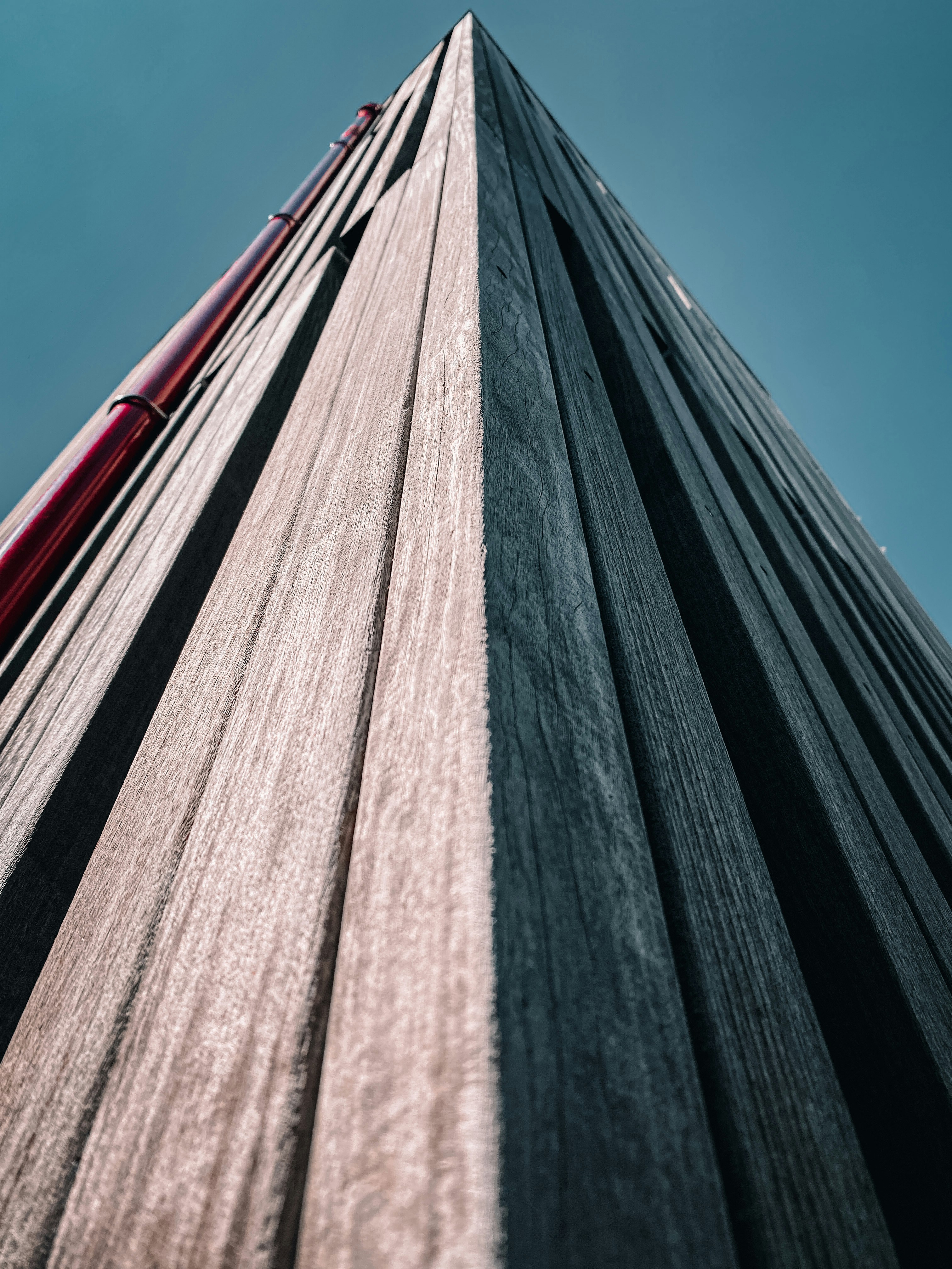 gray and red striped textile