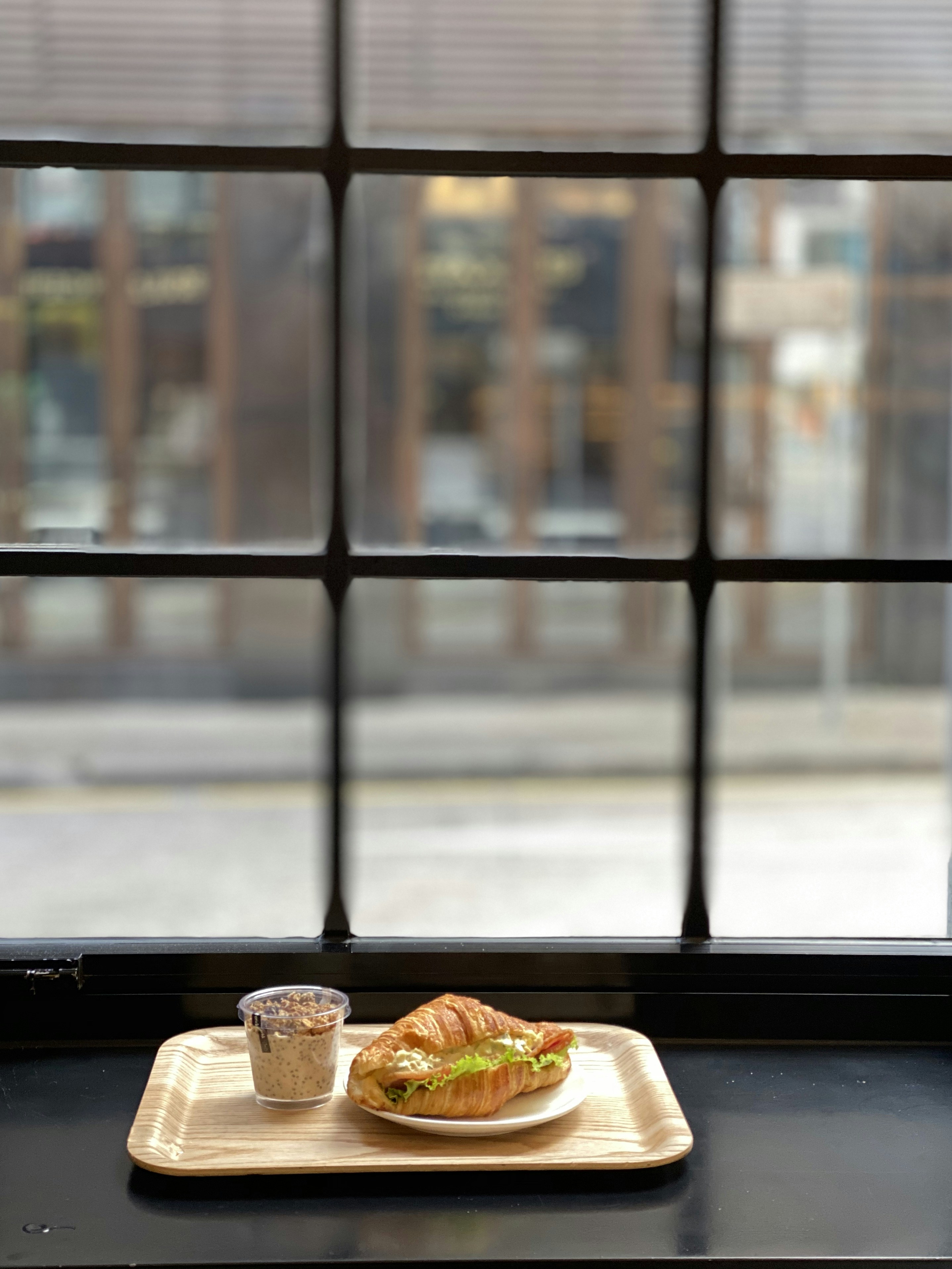 A Quiet Snack by the Window