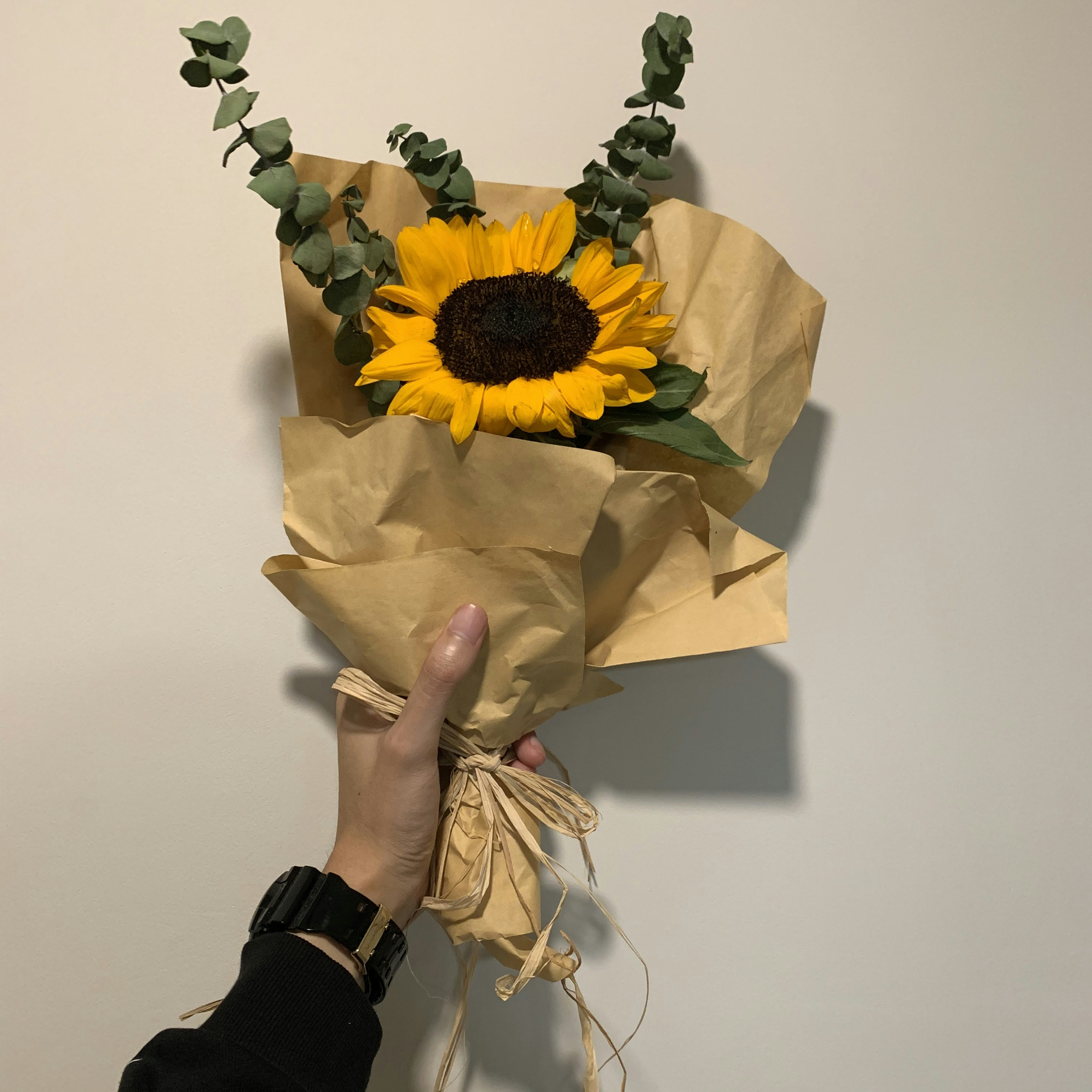 Sunflower Bouquet in Kraft Wrap: A Quiet Handheld Moment