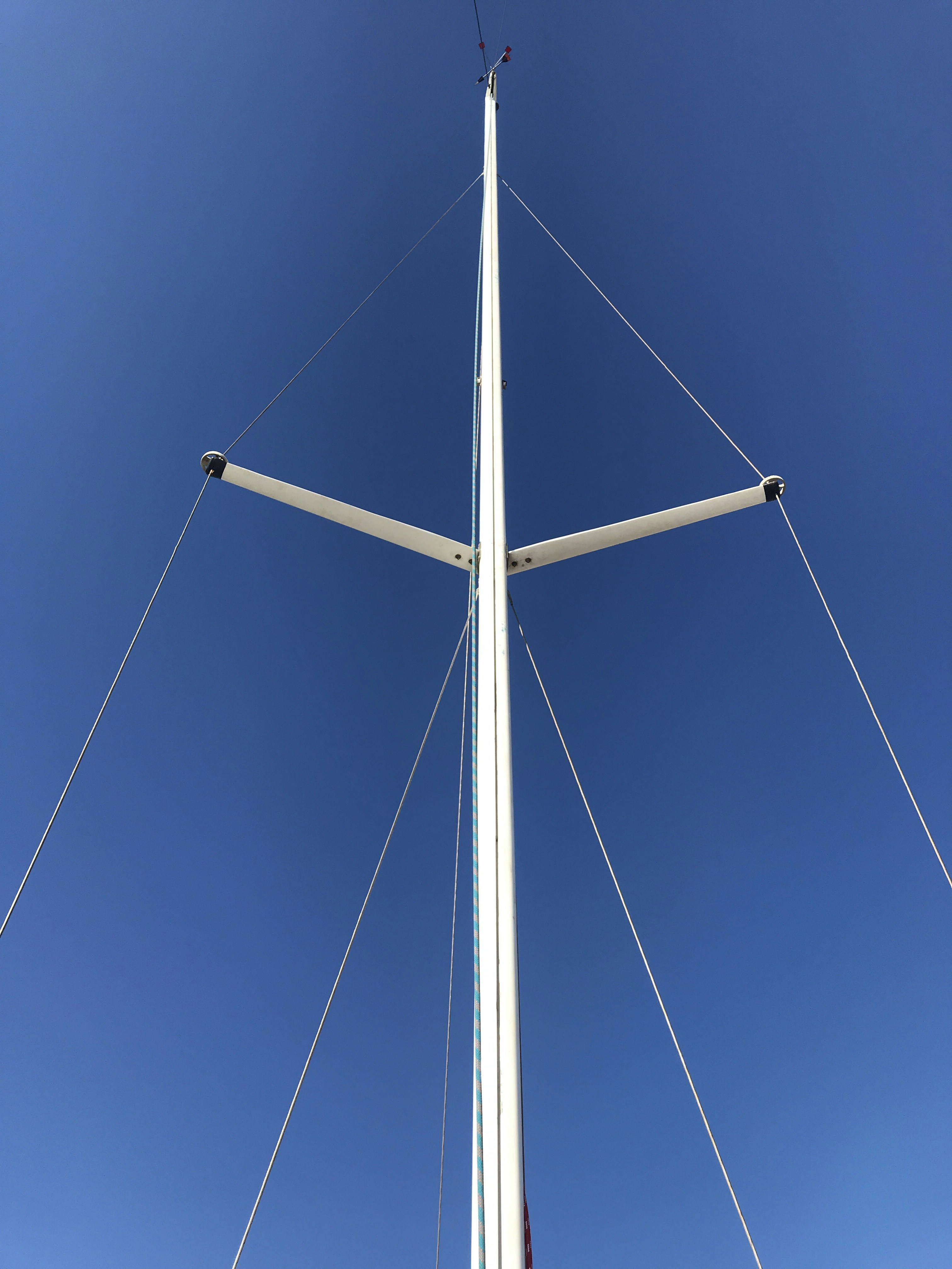 White metal electric post under blue sky during daytime photo – Free ...