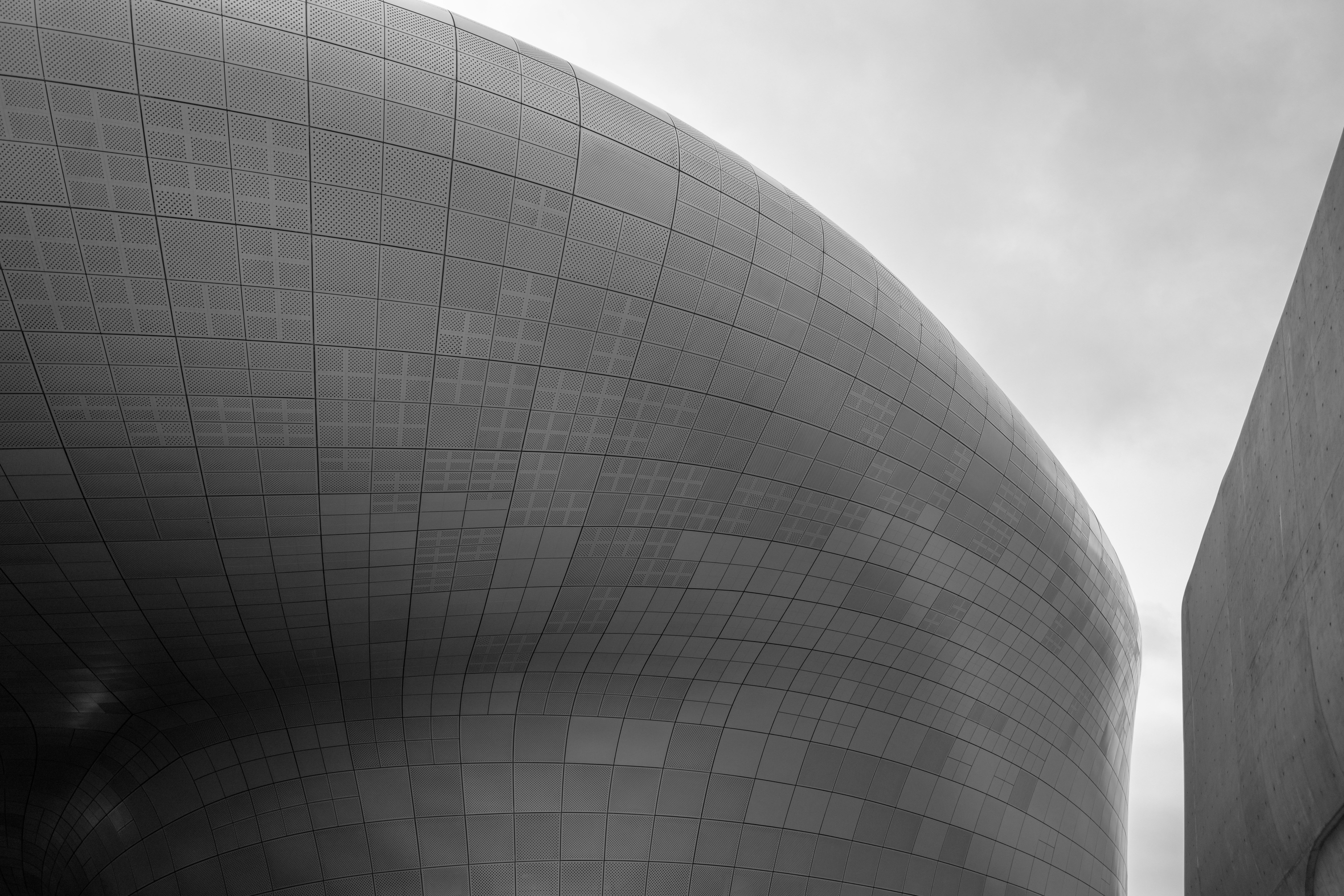Grayscale photo of round concrete building photo – Free Grey Image on ...