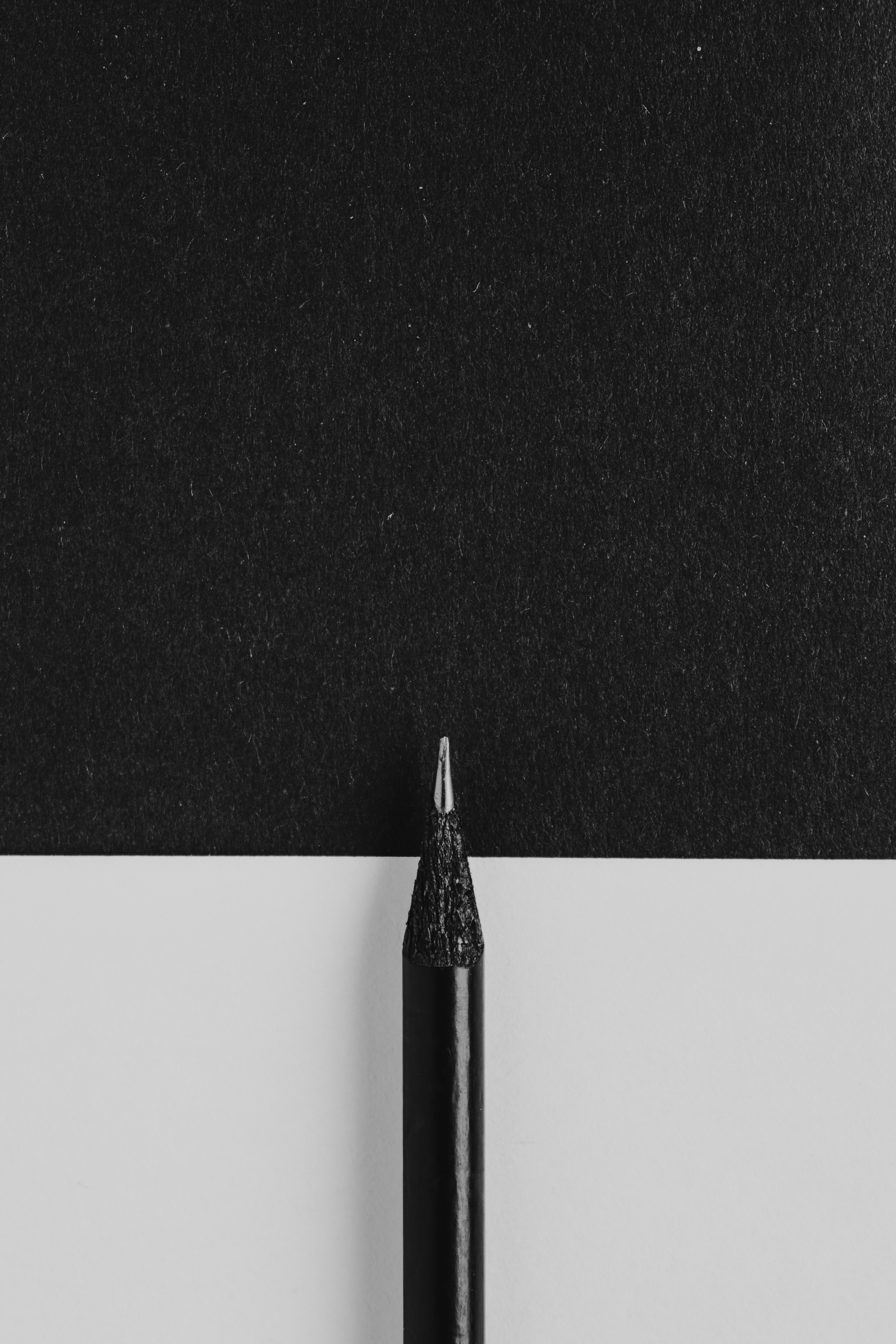 A black pen sitting on top of a piece of paper photo – Free Grey Image ...