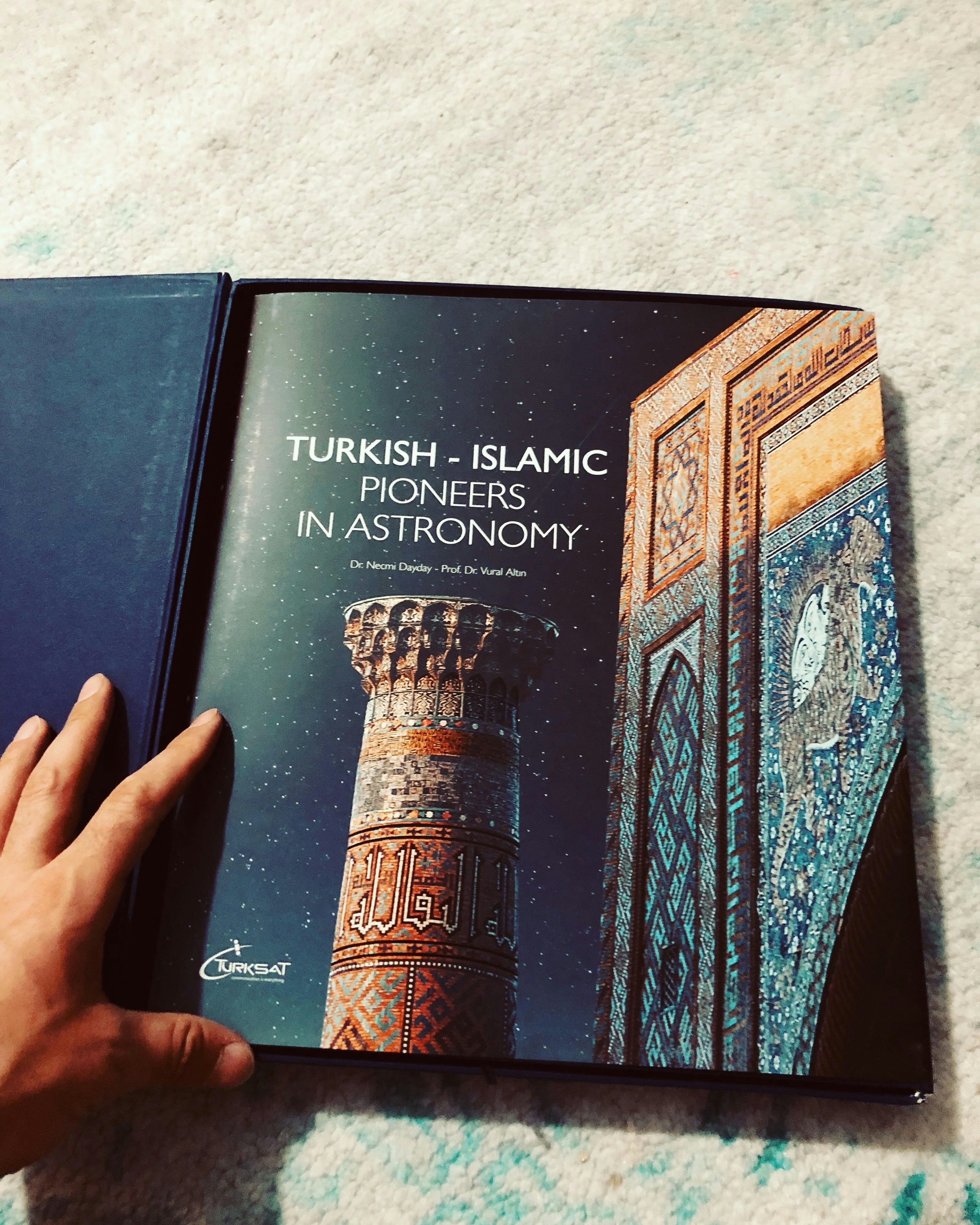 Cover of a book titled 'Turkish-Islamic Pioneers in Astronomy' featuring intricate architectural details and a starry background.