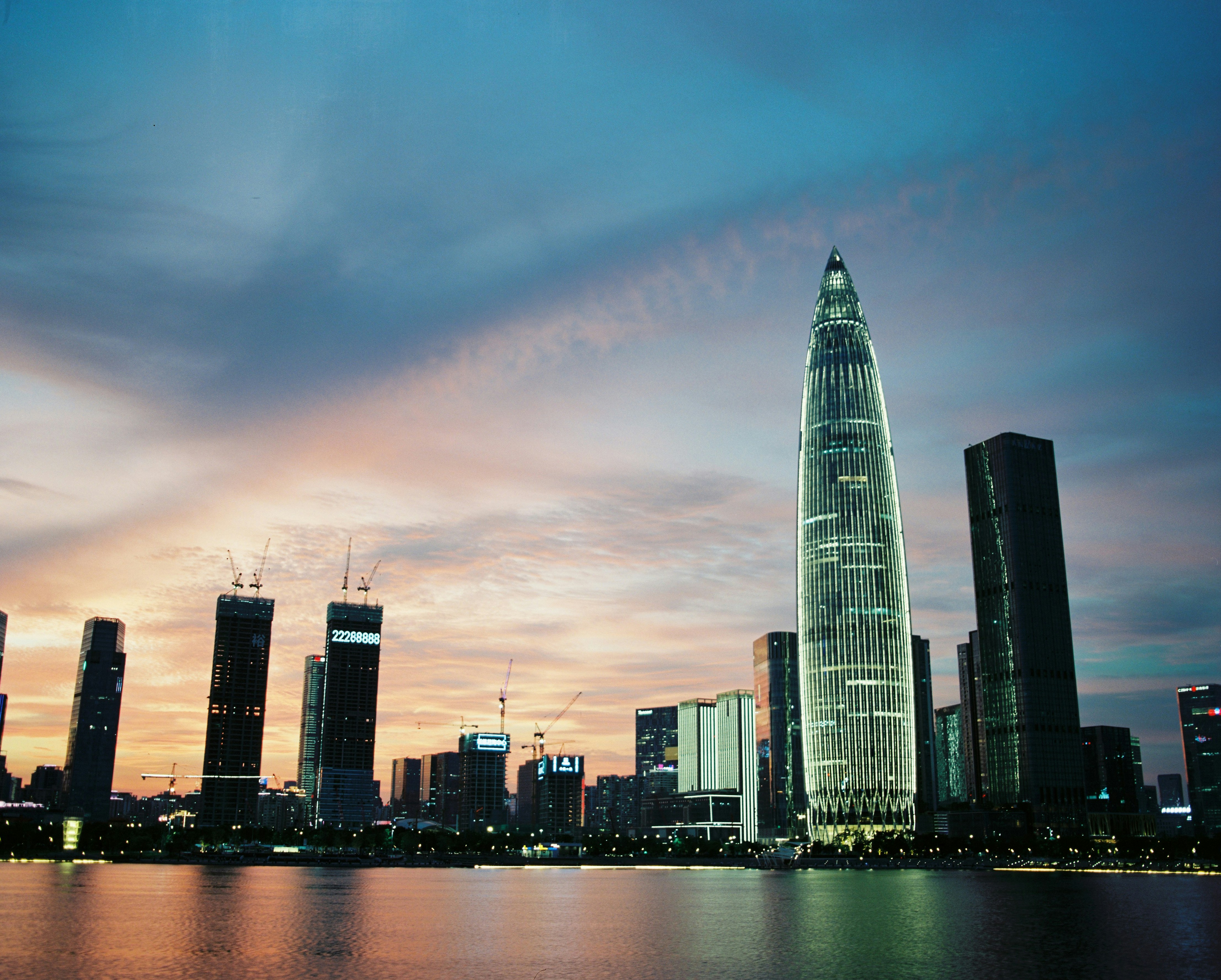 High rise buildings near body of water during daytime photo – Free ...
