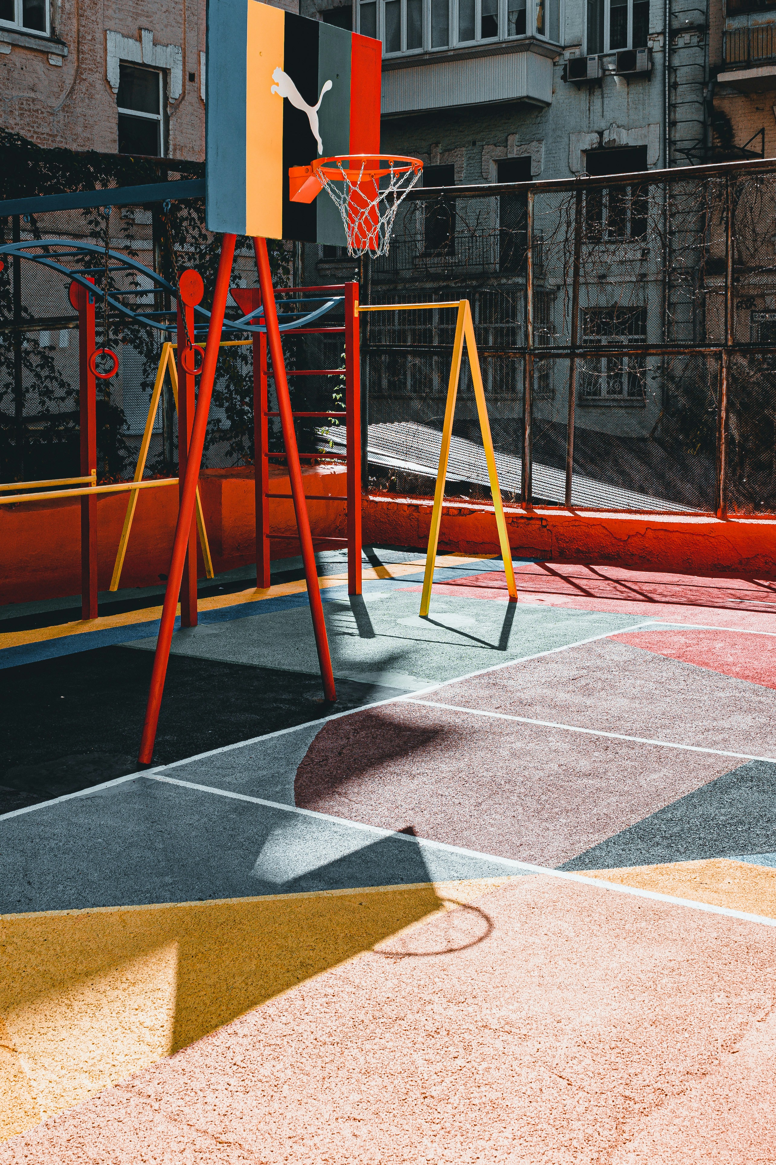 Red and yellow basketball hoop photo – Free Київ Image on Unsplash
