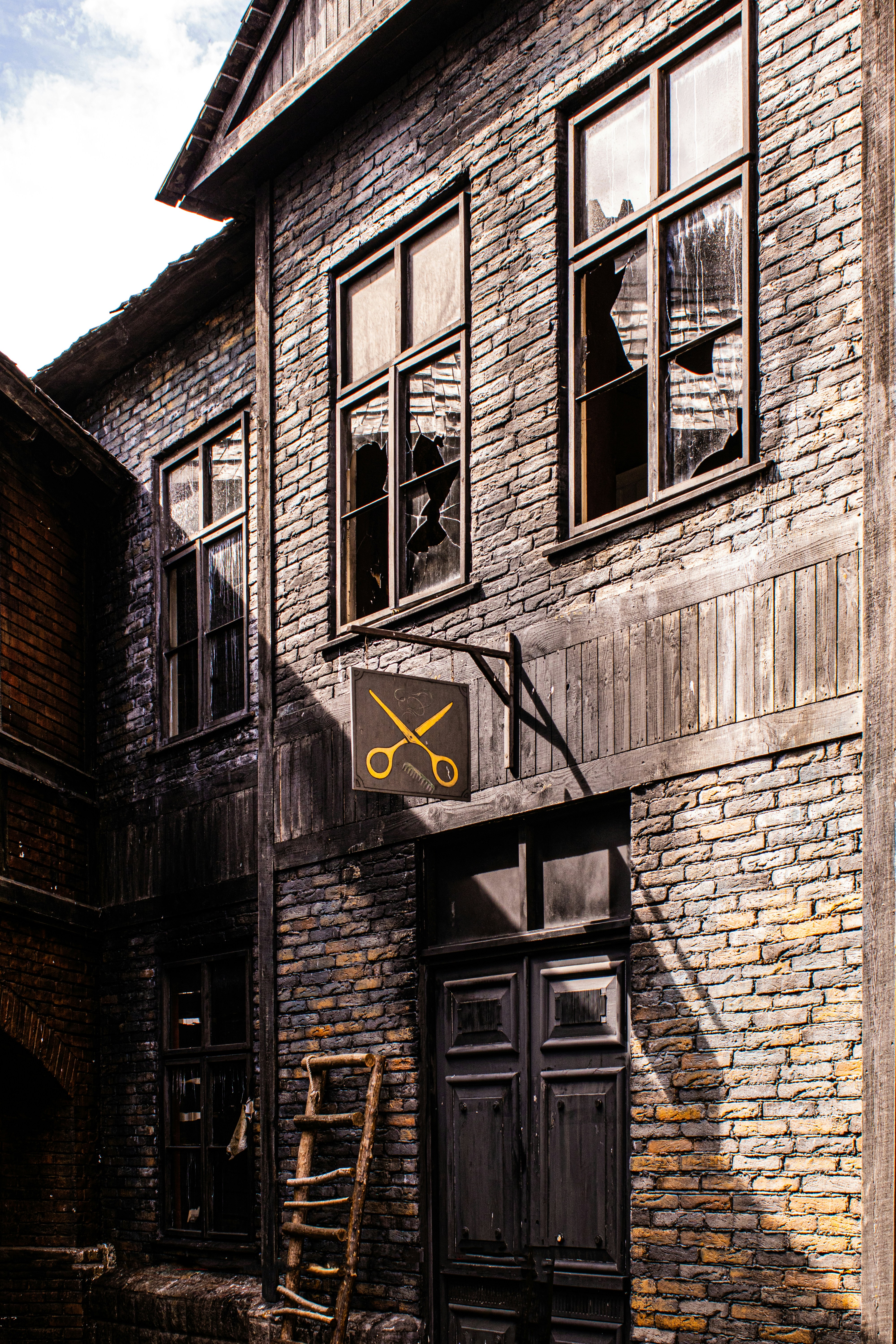 Brown brick building with glass windows photo – Free Latvia Image on Unsplash