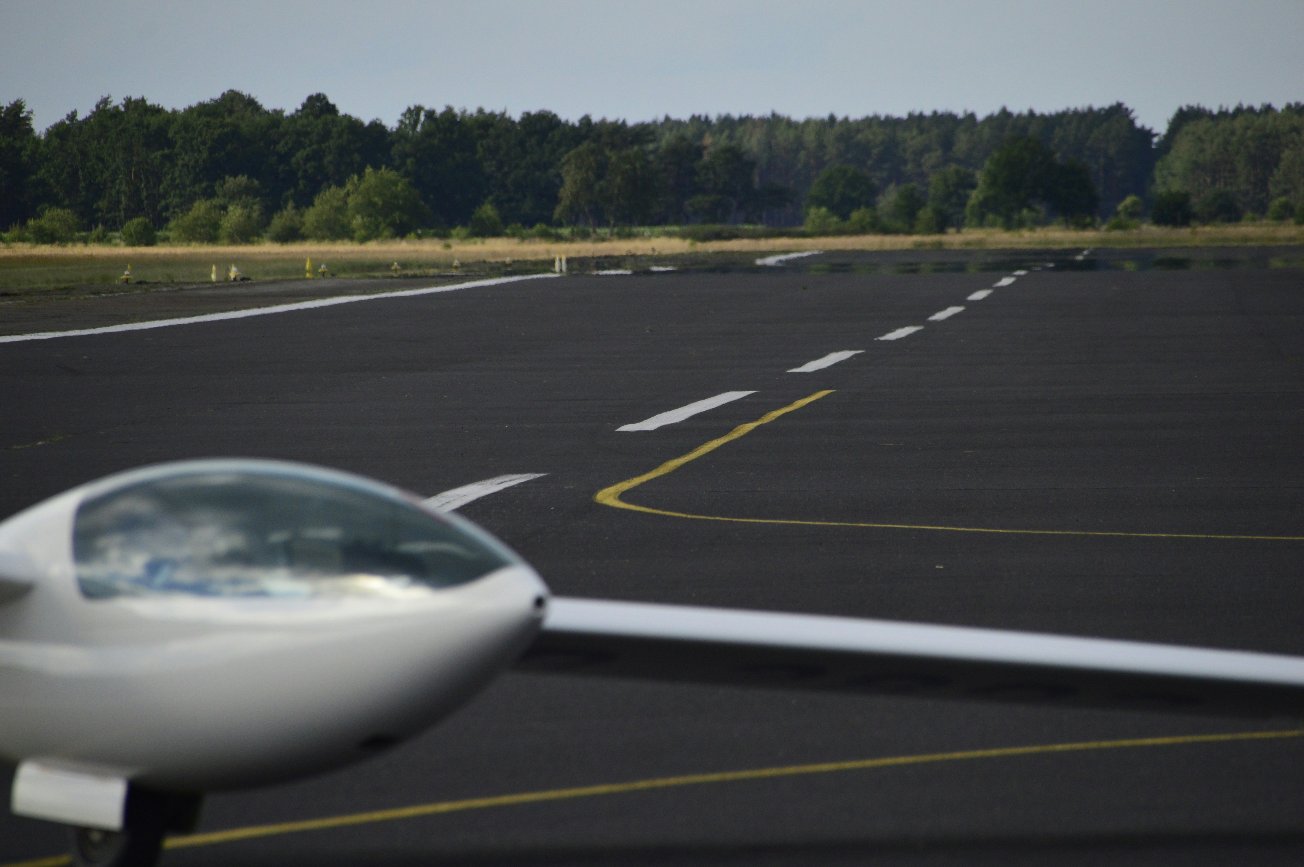 Nose-First on the Runway: Close-Up of Aircraft and Tarmac Geometry