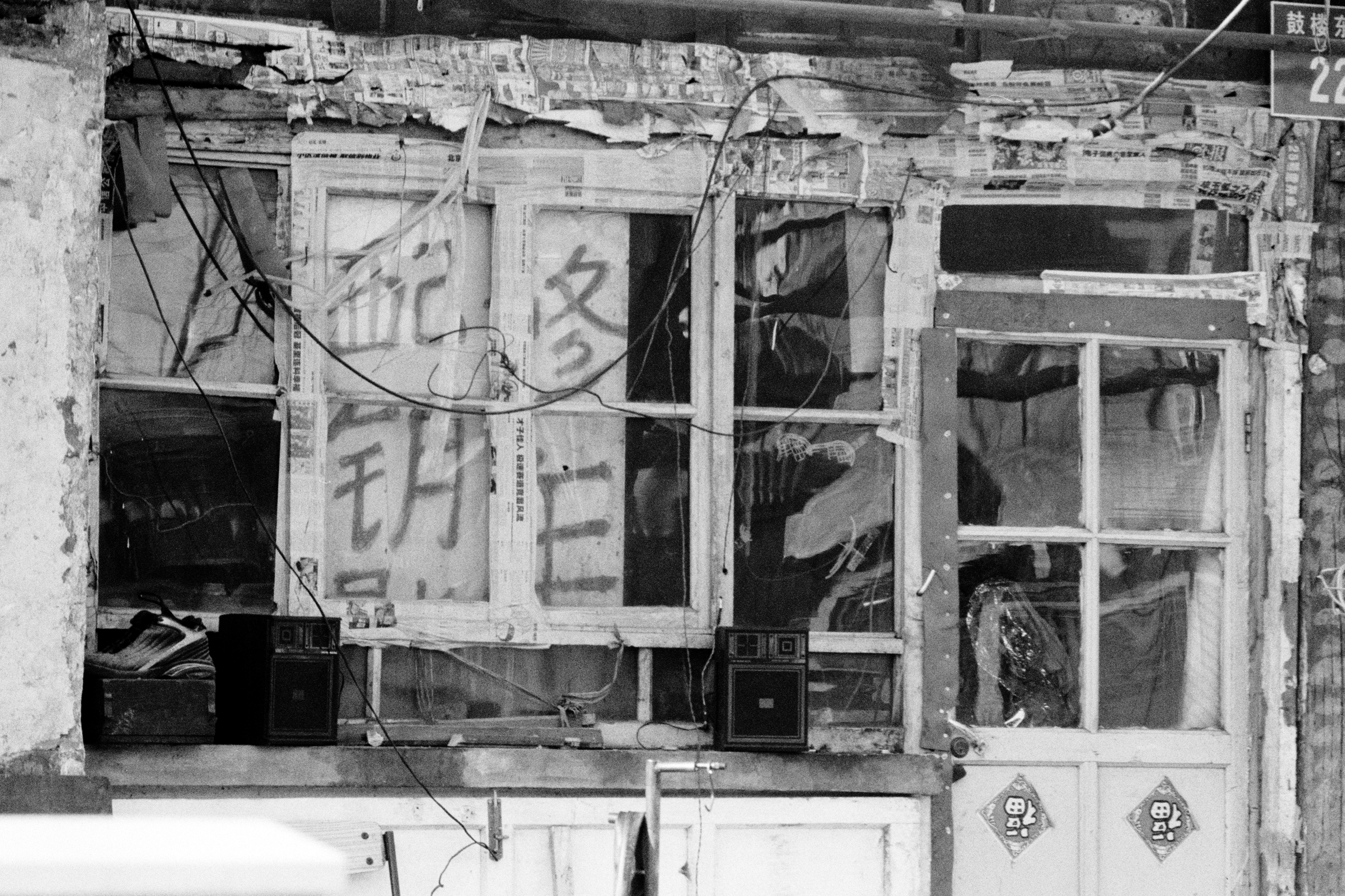 Grayscale photo of man in front of window photo – Free Film photography ...