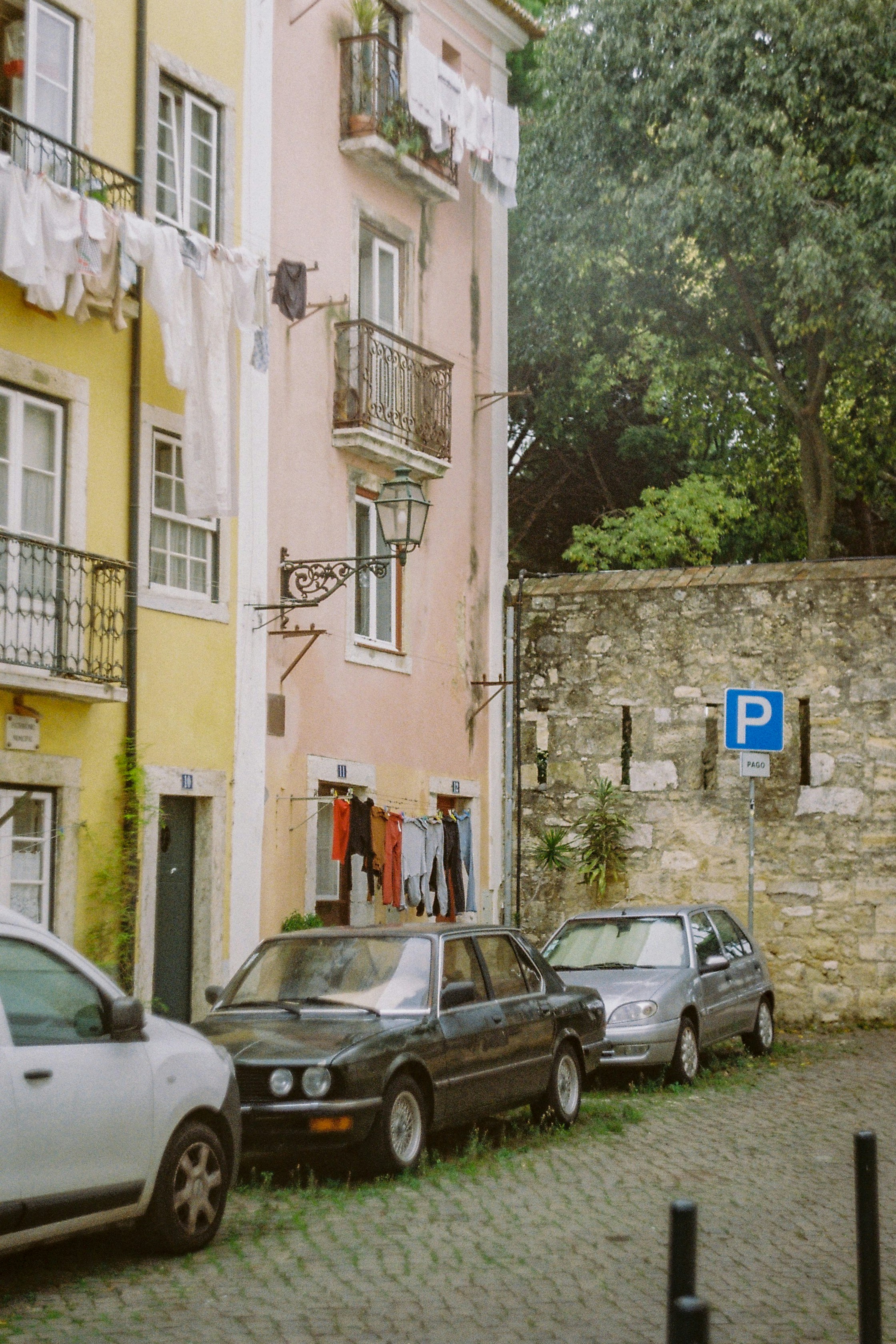 Colorful European Street: Laundry Lines and Friendly Facade