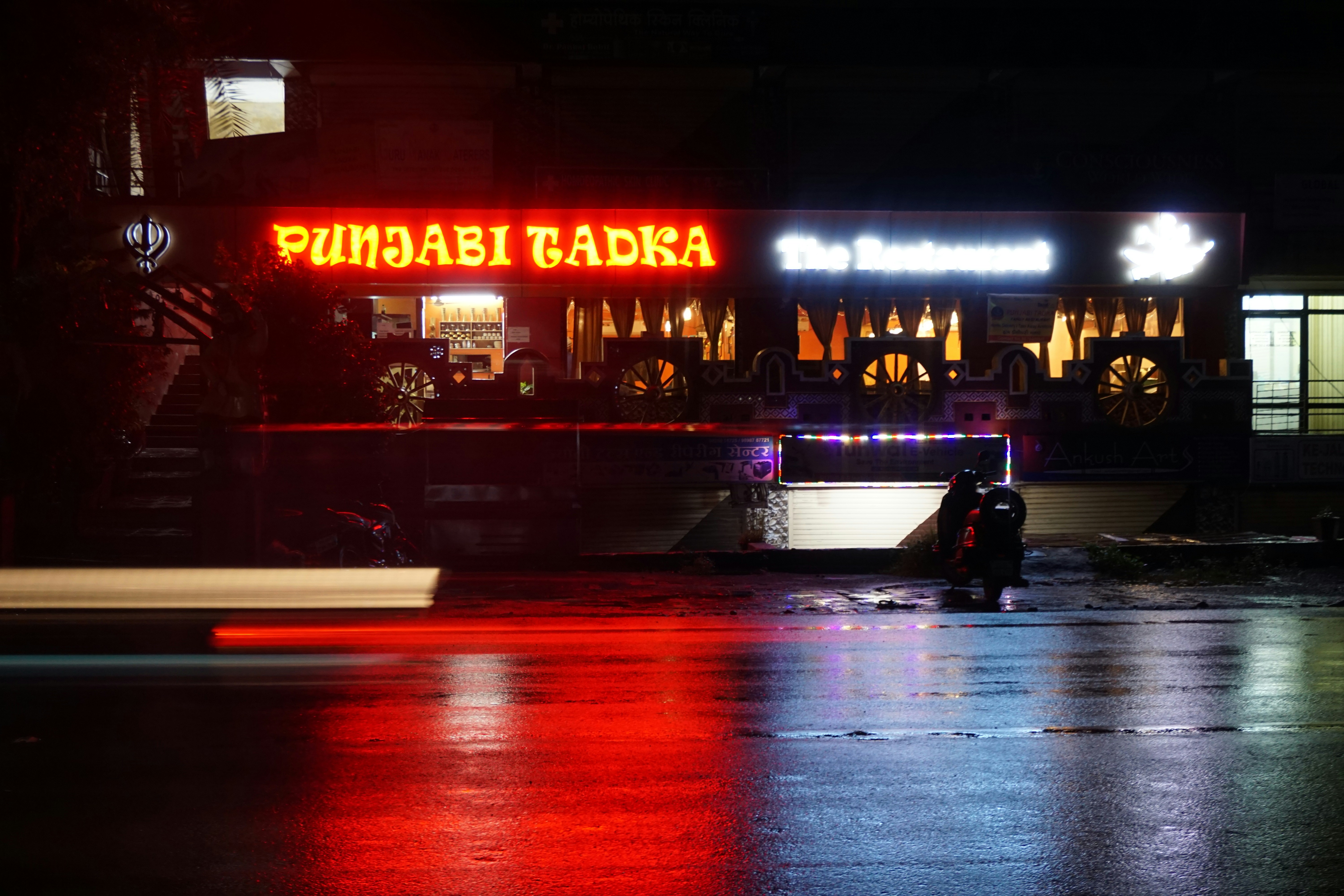Neon Reflections: A Night at Punjabi Tadka