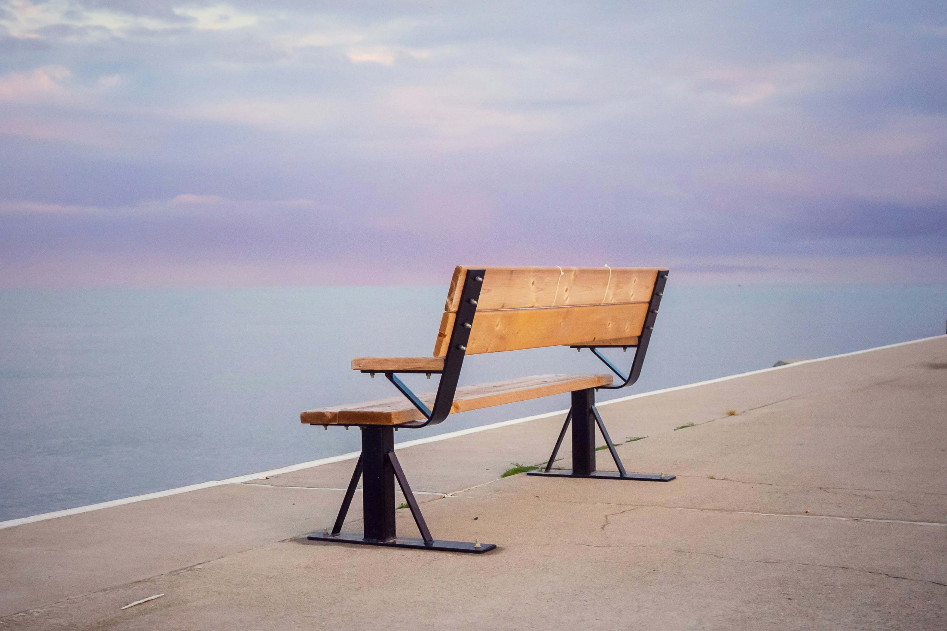 Lonely Bench Overlooking a Calm Horizon