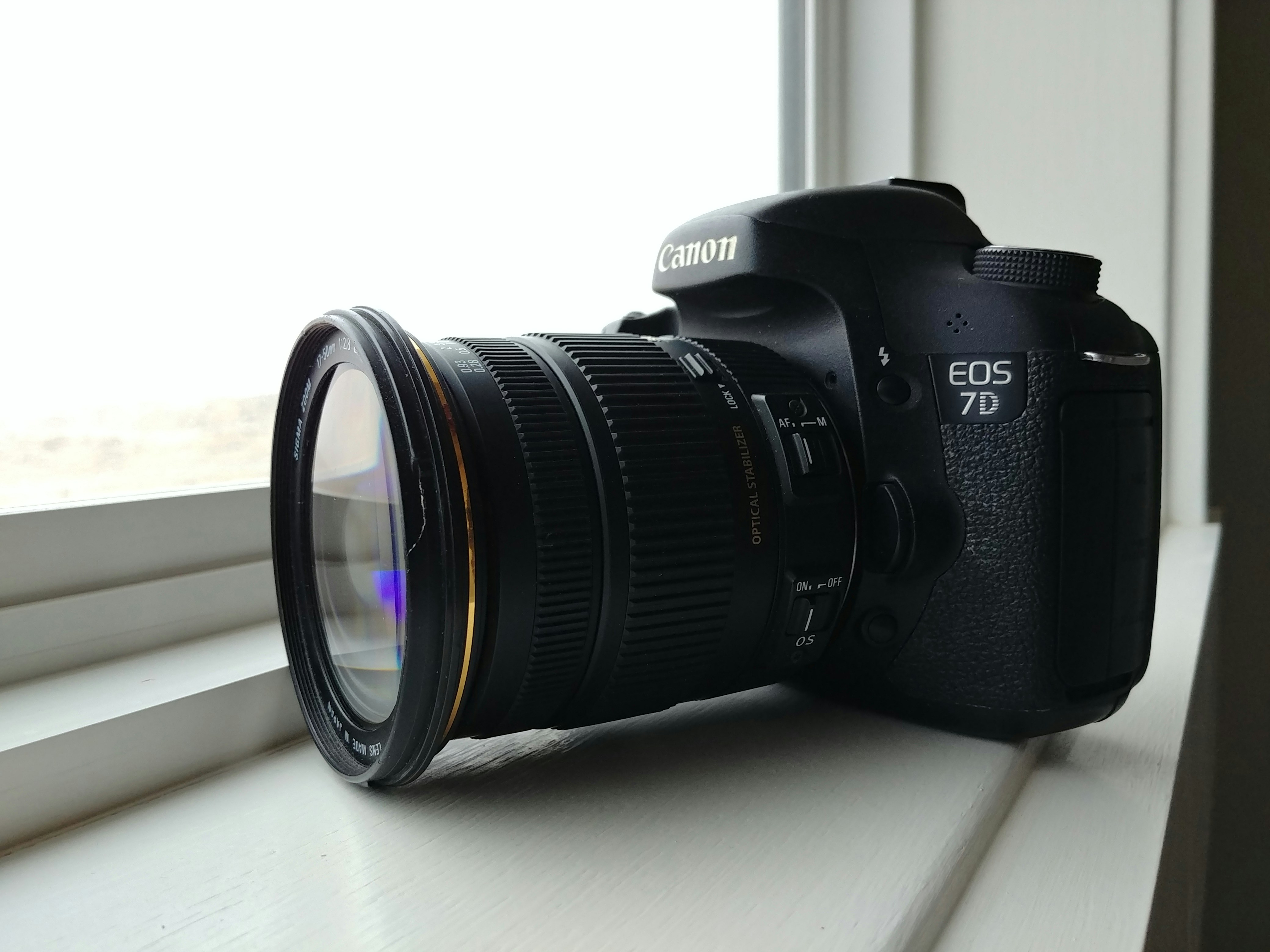 Black nikon dslr camera on white table photo – Free Black Image on Unsplash