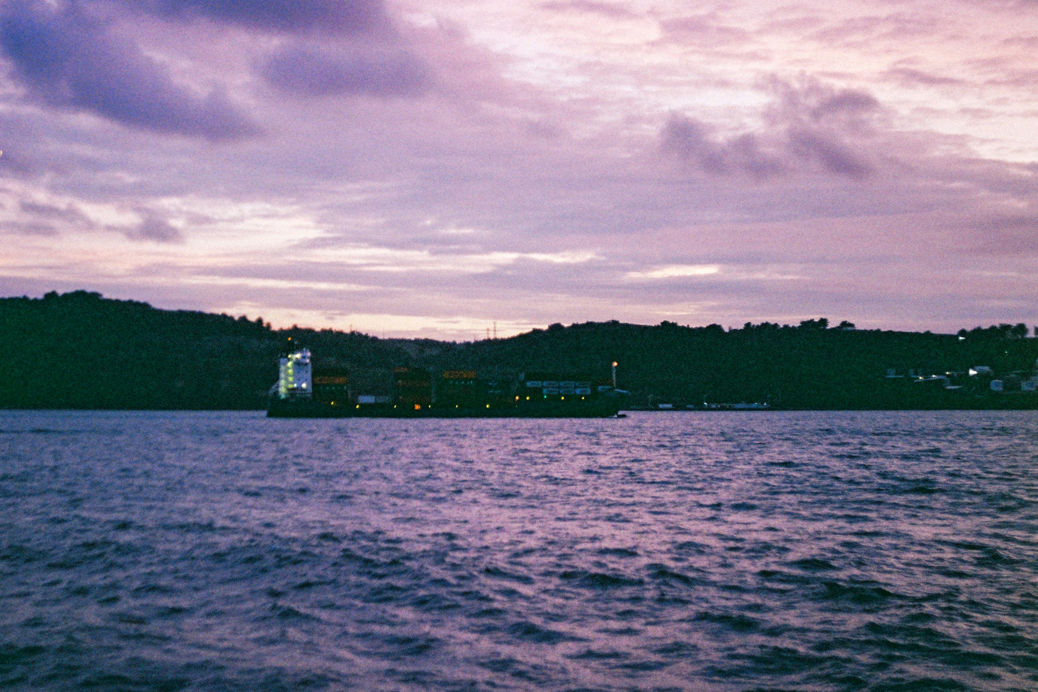 Dusk Harbor Silhouette: Lights Along the Quiet Shore